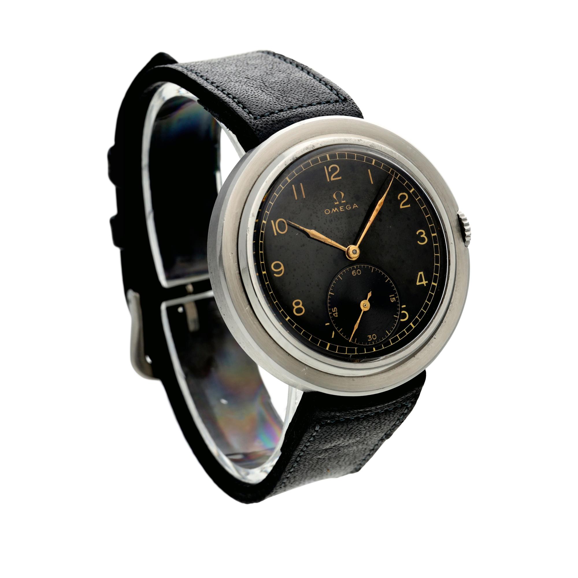 Disco Volante, An oversized stainless steel wristwatch with gilt dial ...