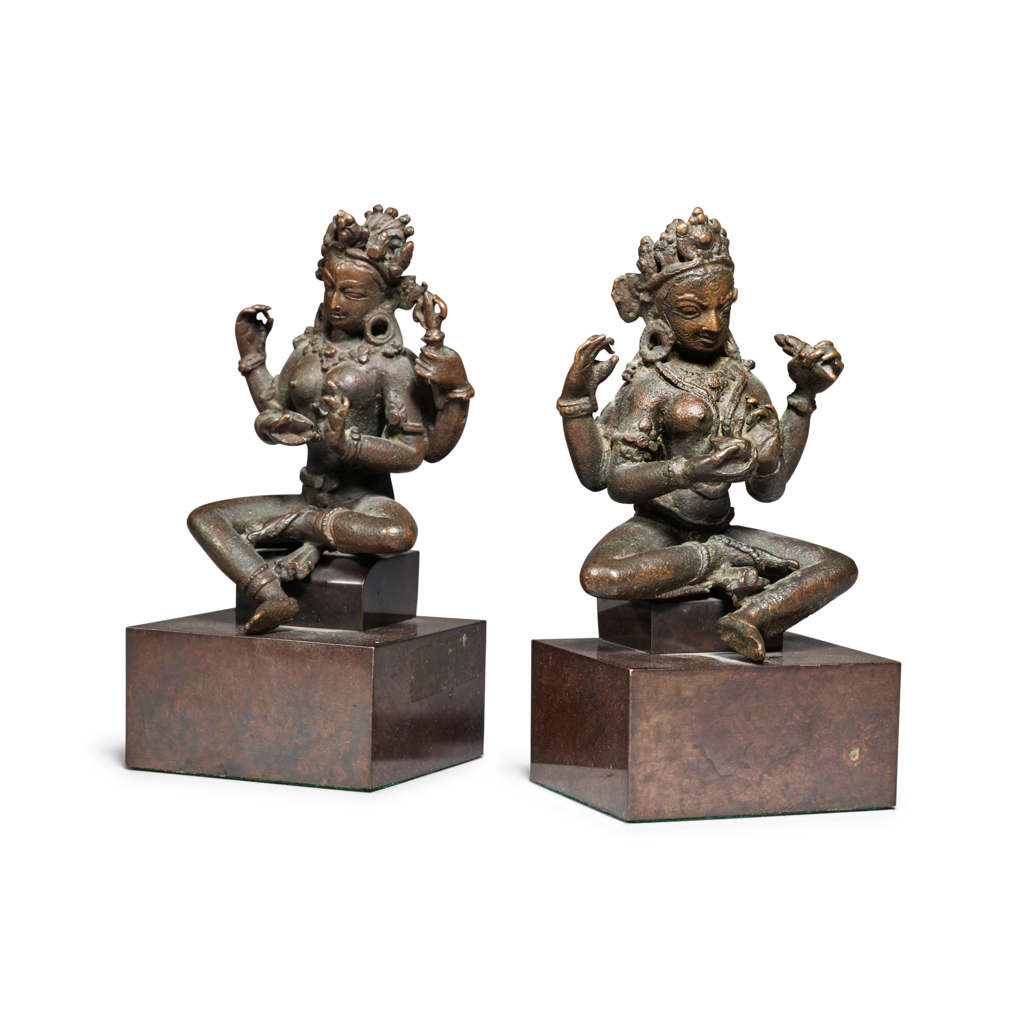 A pair of copper alloy figures of Matrikas, Nepal, 14th century ...