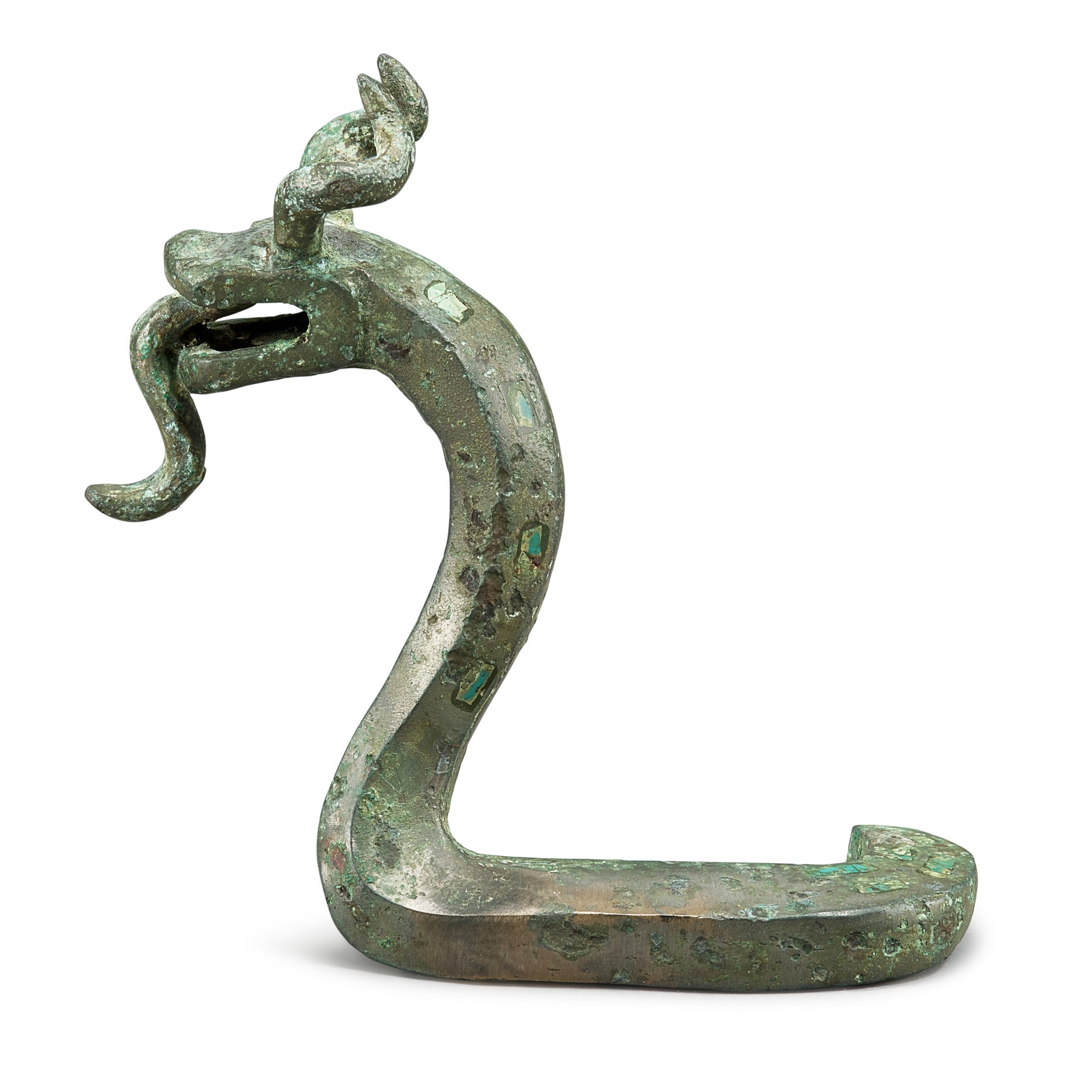 A turquoise-inlaid archaic bronze 'dragon' chariot fitting Spring and ...