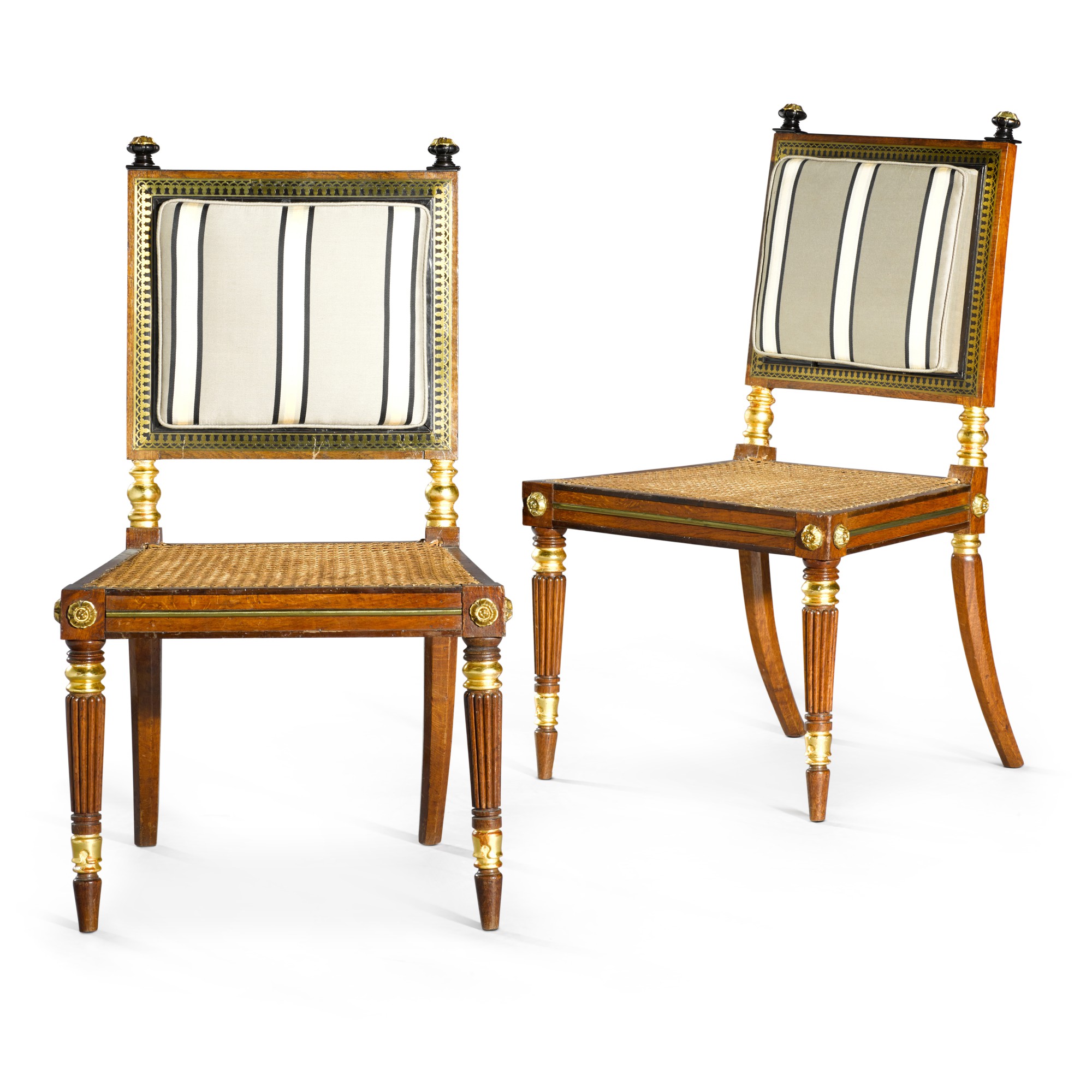 A pair of Regency ormolu-mounted brass-inlaid ebony and oak side chairs ...