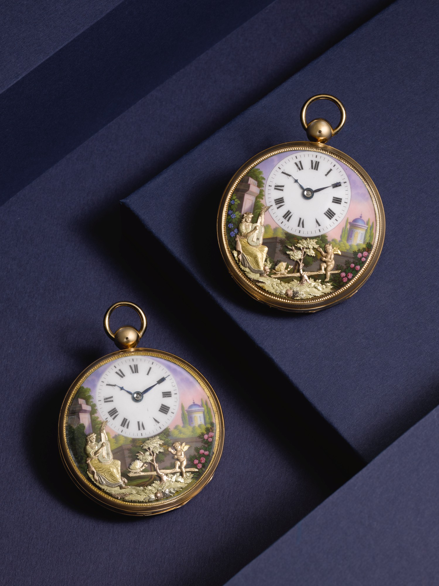 A PAIR OF VERY FINE AND RARE GOLD AND ENAMEL MUSICAL AUTOMATON WATCHES ...