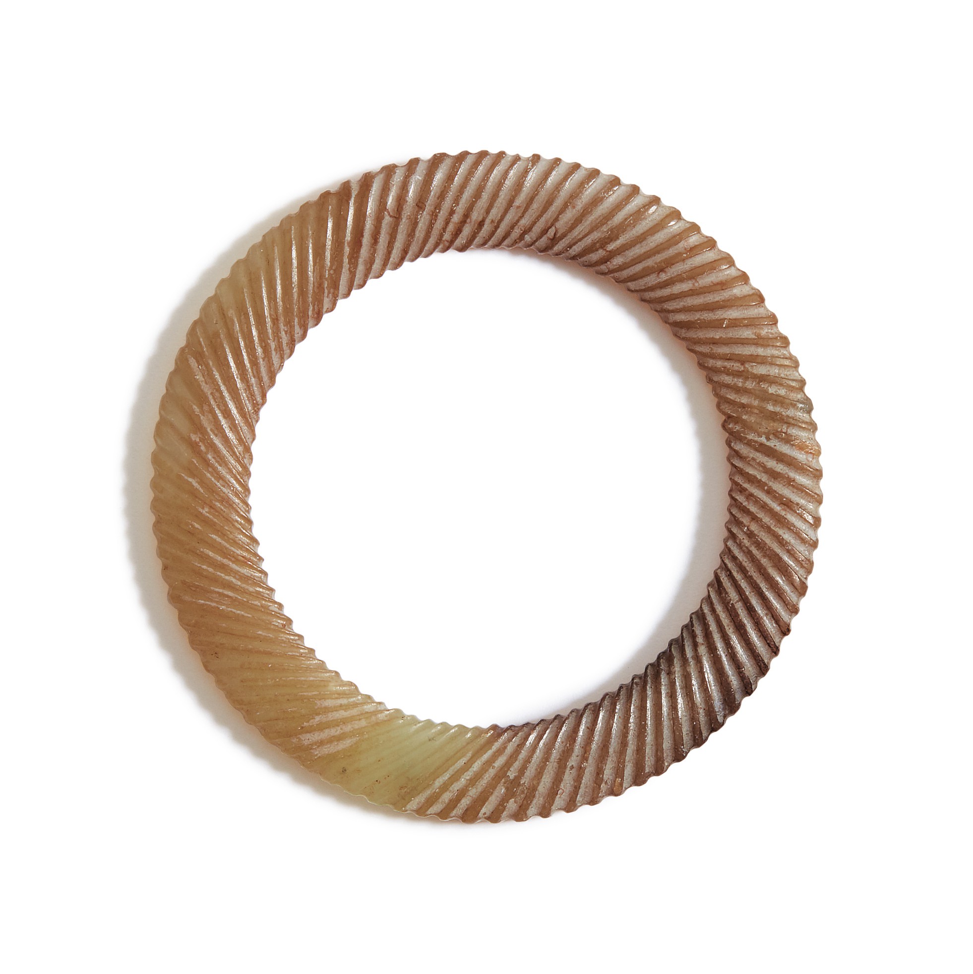 A JADE 'TWISTED ROPE' ORNAMENTAL RING-DISC, EASTERN ZHOU DYNASTY OR ...