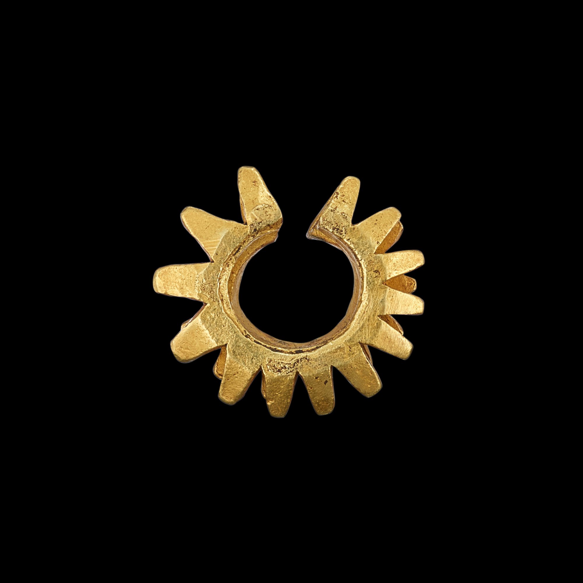 A double-layered solid gold earring Java, Indonesia, 7th - 12th century ...