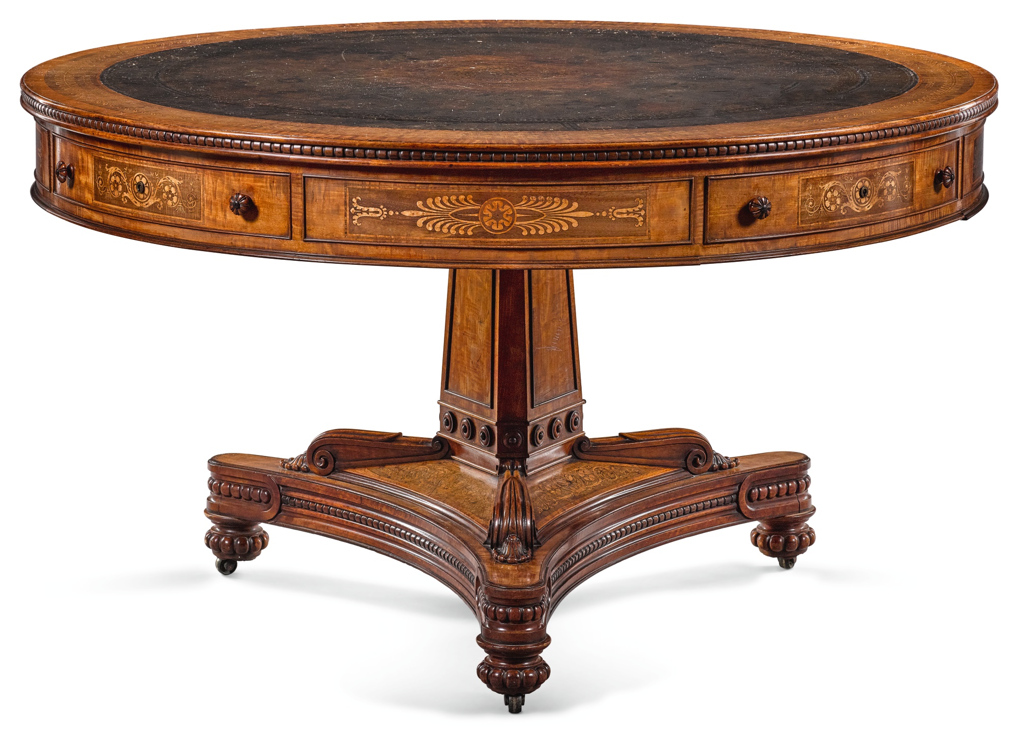 A REGENCY SATINWOOD, MAHOGANY AND MARQUETRY LIBRARY DRUM TABLE, CIRCA ...