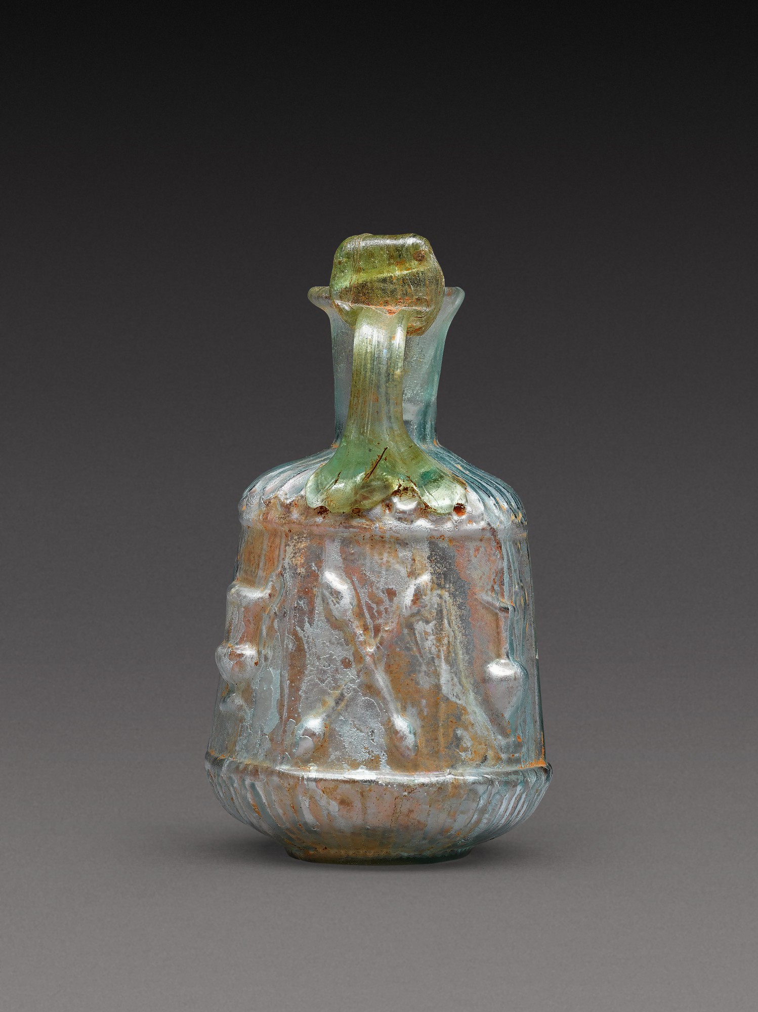 A Roman Pale Green Mould-Blown Glass Flask, circa 1st century A.D ...