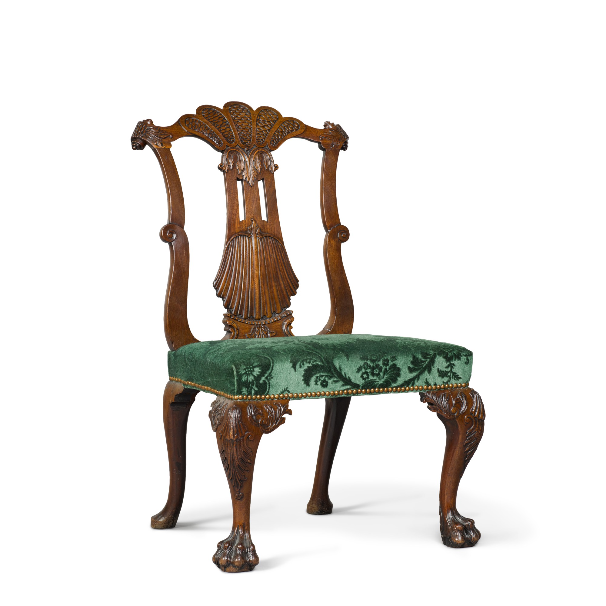 A George II carved mahogany side chair, circa 1740, in the manner of ...