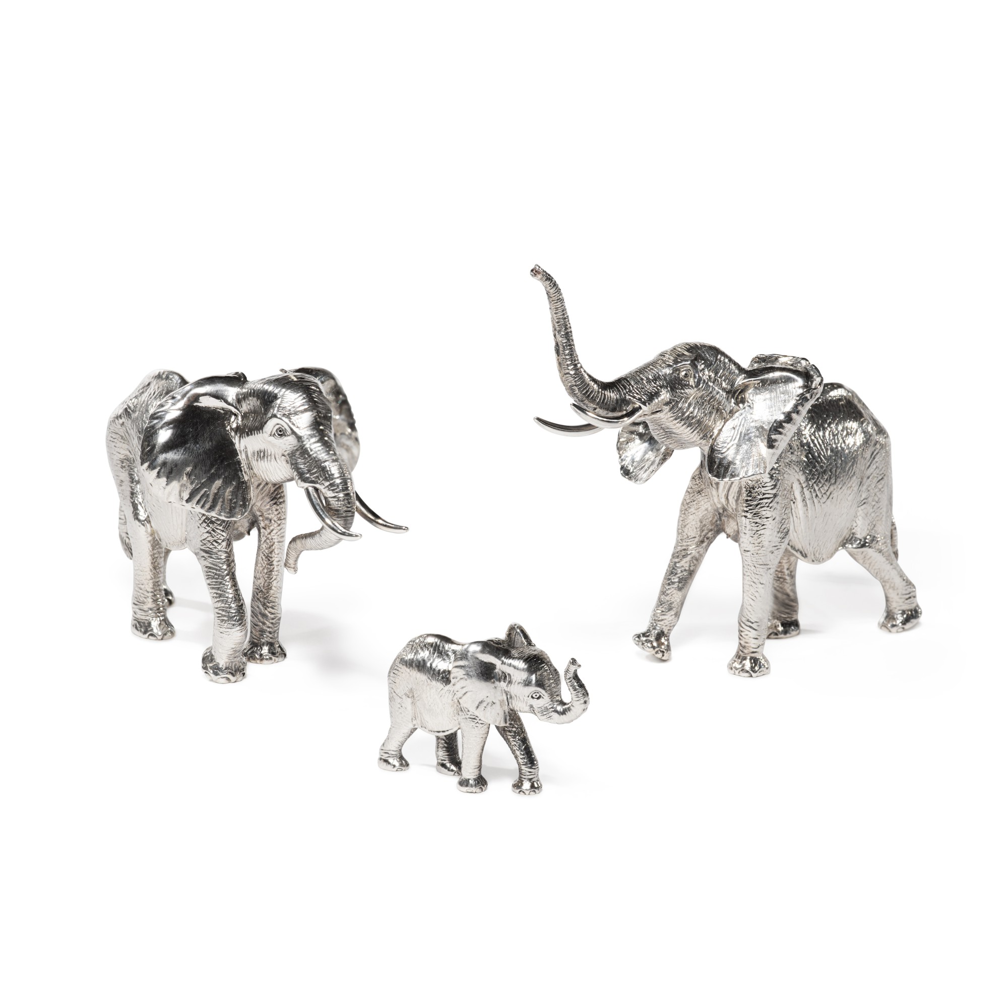 A Zimbabwean Silver Acacia Tree Two-Light Candelabrum and Nine ...