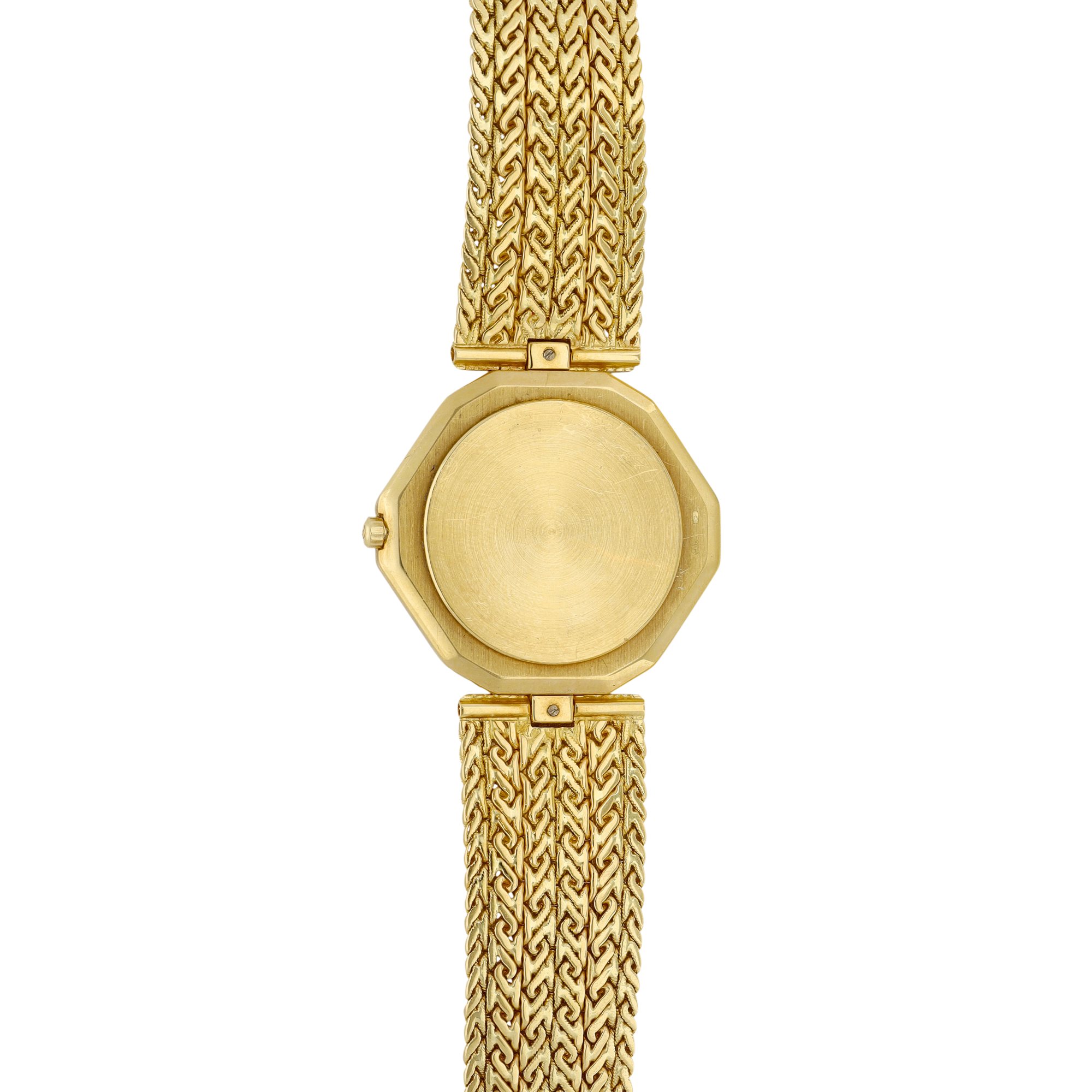 A yellow gold, diamond, red enamel and ruby-set bracelet watch, Circa ...