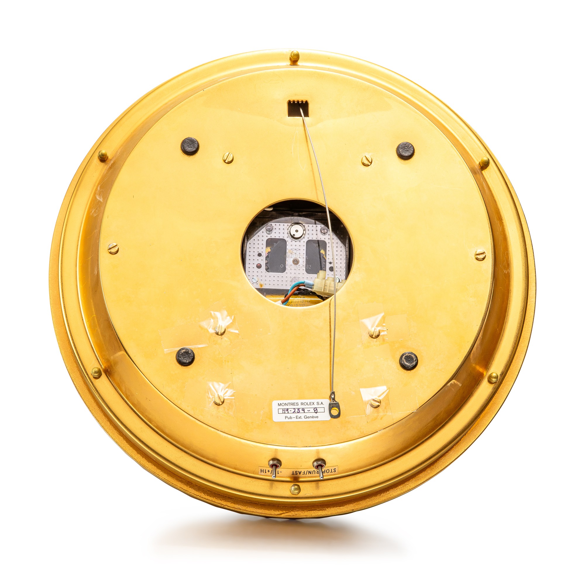 Rolex | Manufactured by Inducta, A gilt brass wall clock, Circa 2010 ...