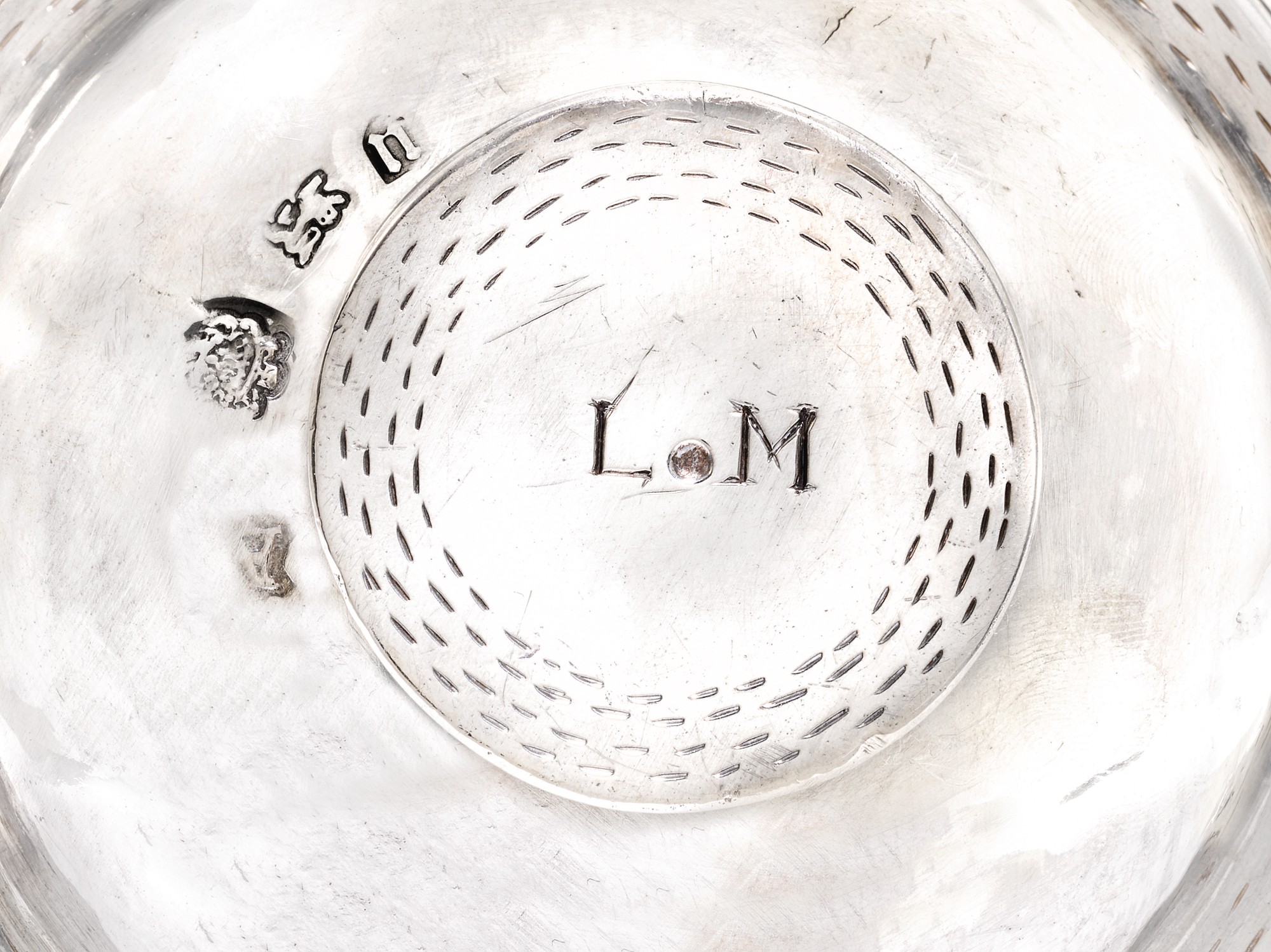 An Elizabeth I silver chalice and paten, maker's mark A, possibly for ...