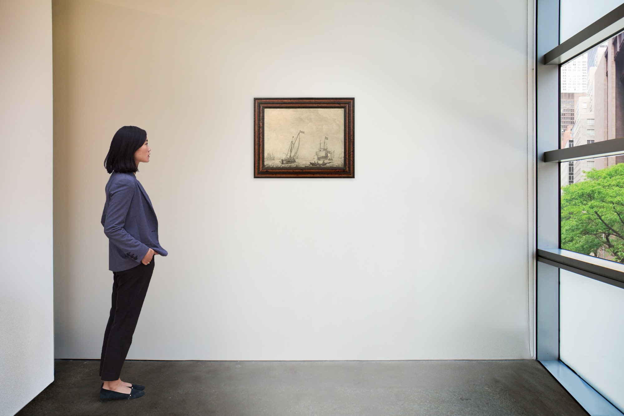 A coastal scene with a three-master, a kaag on a broad reach and other ...