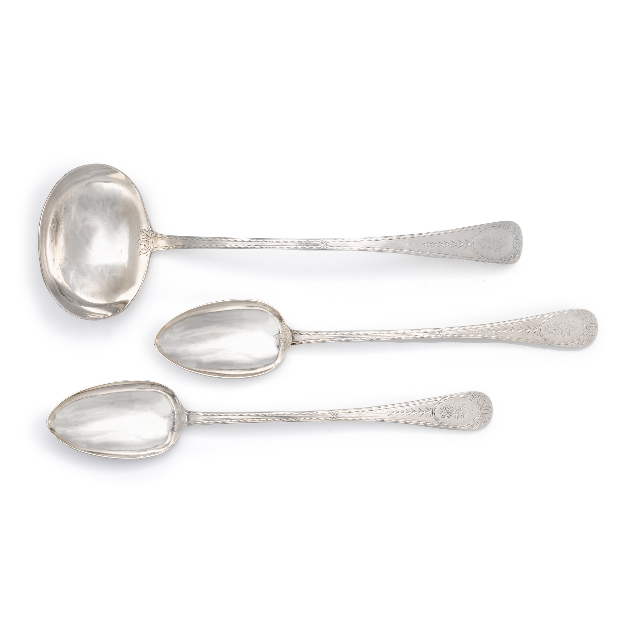 A Victorian silver soup ladle and two basting spoons, George & Michael ...