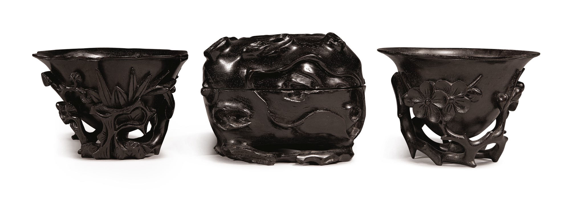 Two 'zitan' libation cups and a 'zitan' box and cover, Qing dynasty ...