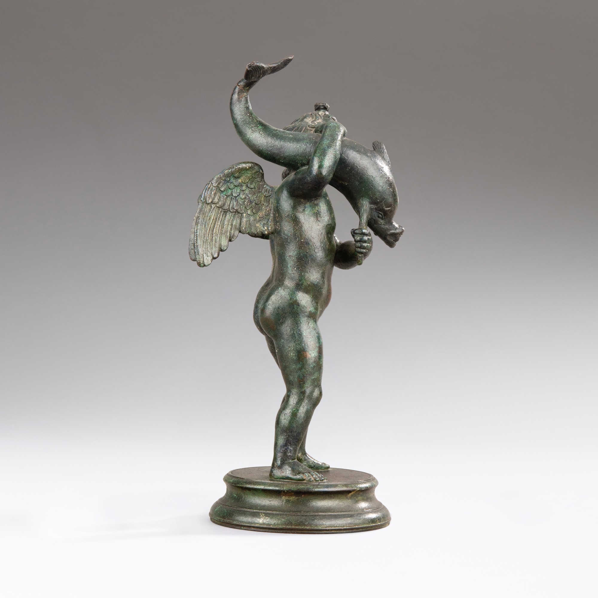 Cupid carrying a dolphin on his shoulder | Cupidon portant un dauphin ...