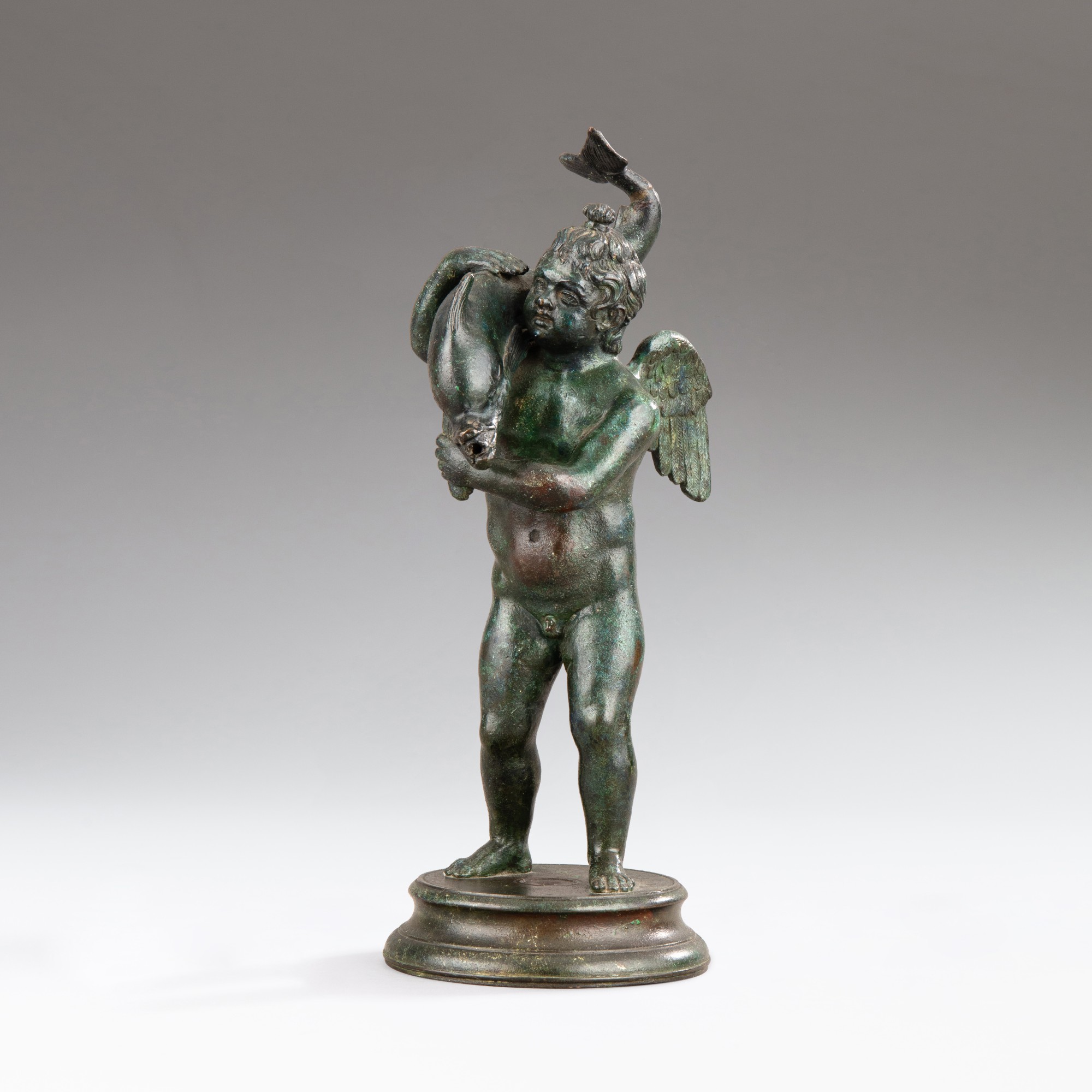 Cupid carrying a dolphin on his shoulder | Cupidon portant un dauphin ...