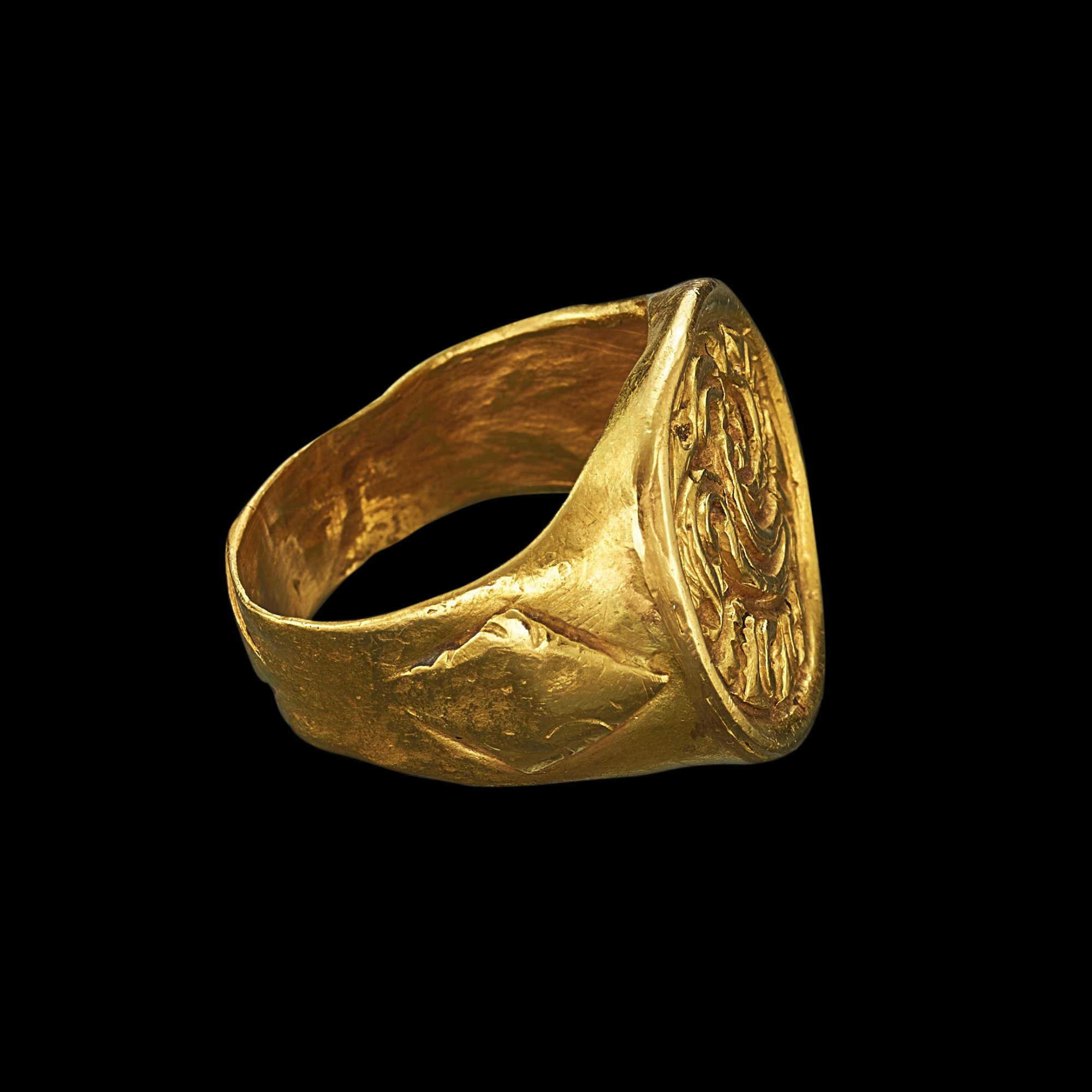 A gold repoussé ring with spirals Java, Indonesia, 7th-12th century ...