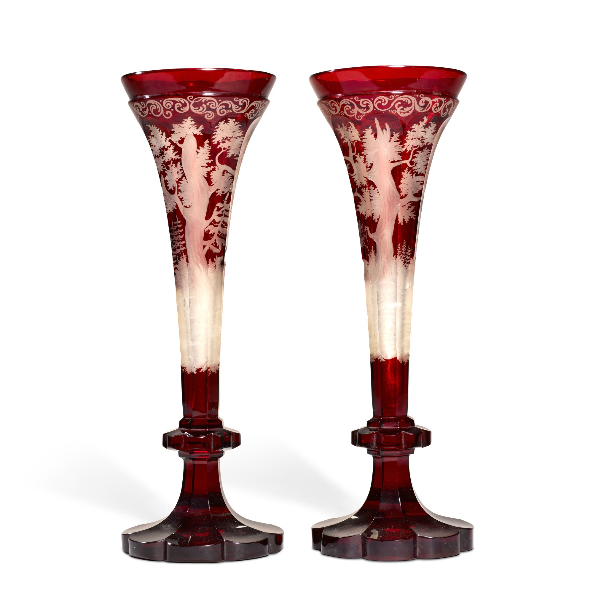 A pair of Bohemian ruby-stained and engraved glass trumpet vases, late ...