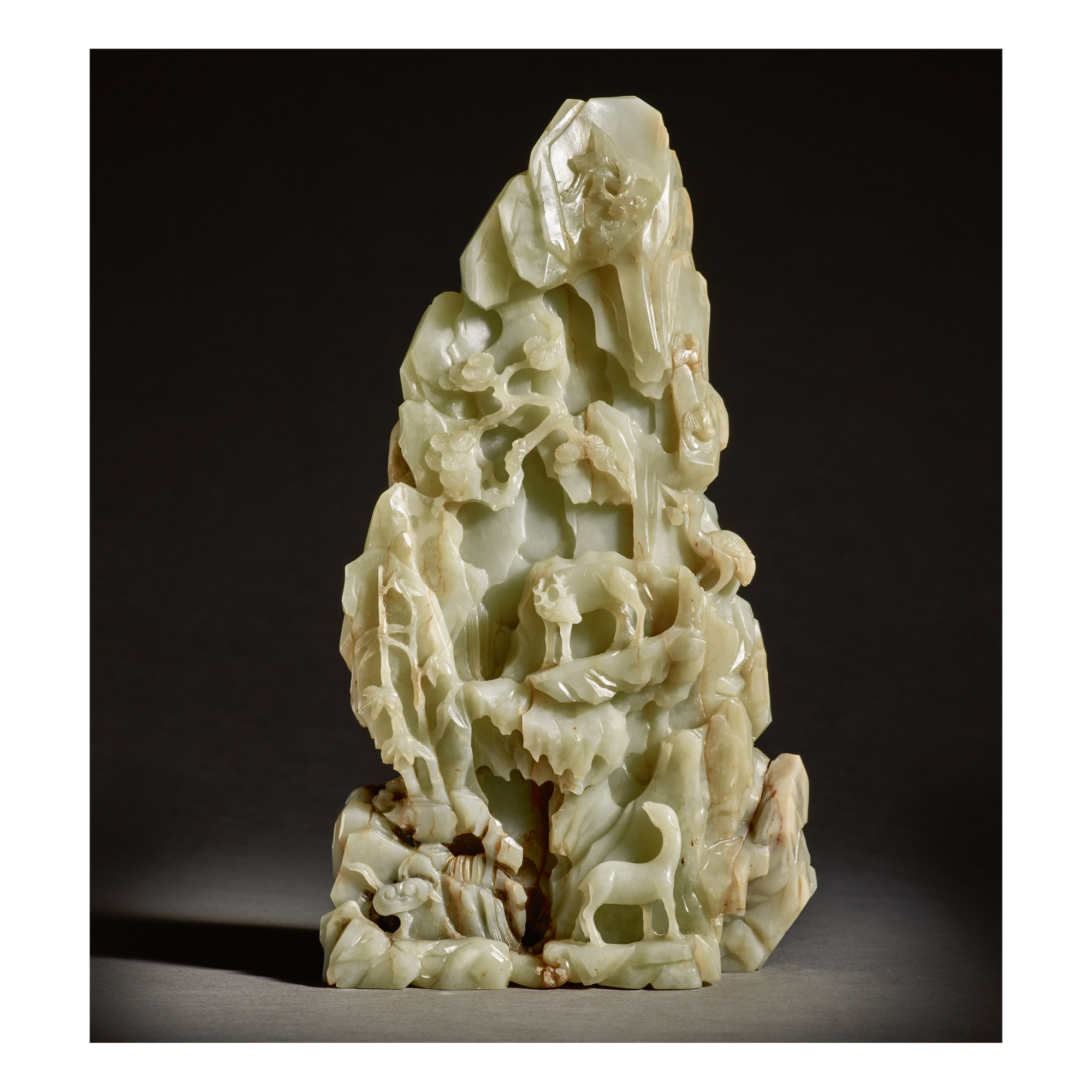 A LARGE CELADON JADE MOUNTAIN, QING DYNASTY, EARLY 18TH CENTURY ...