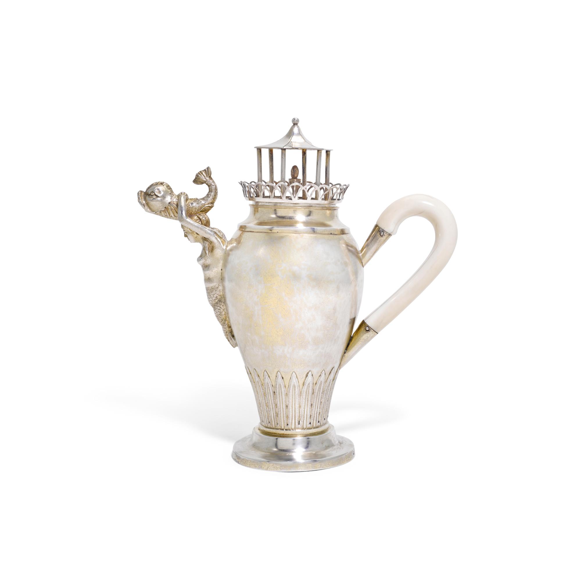 An unusual German parcel-gilt silver coffee pot, maker's mark double ...