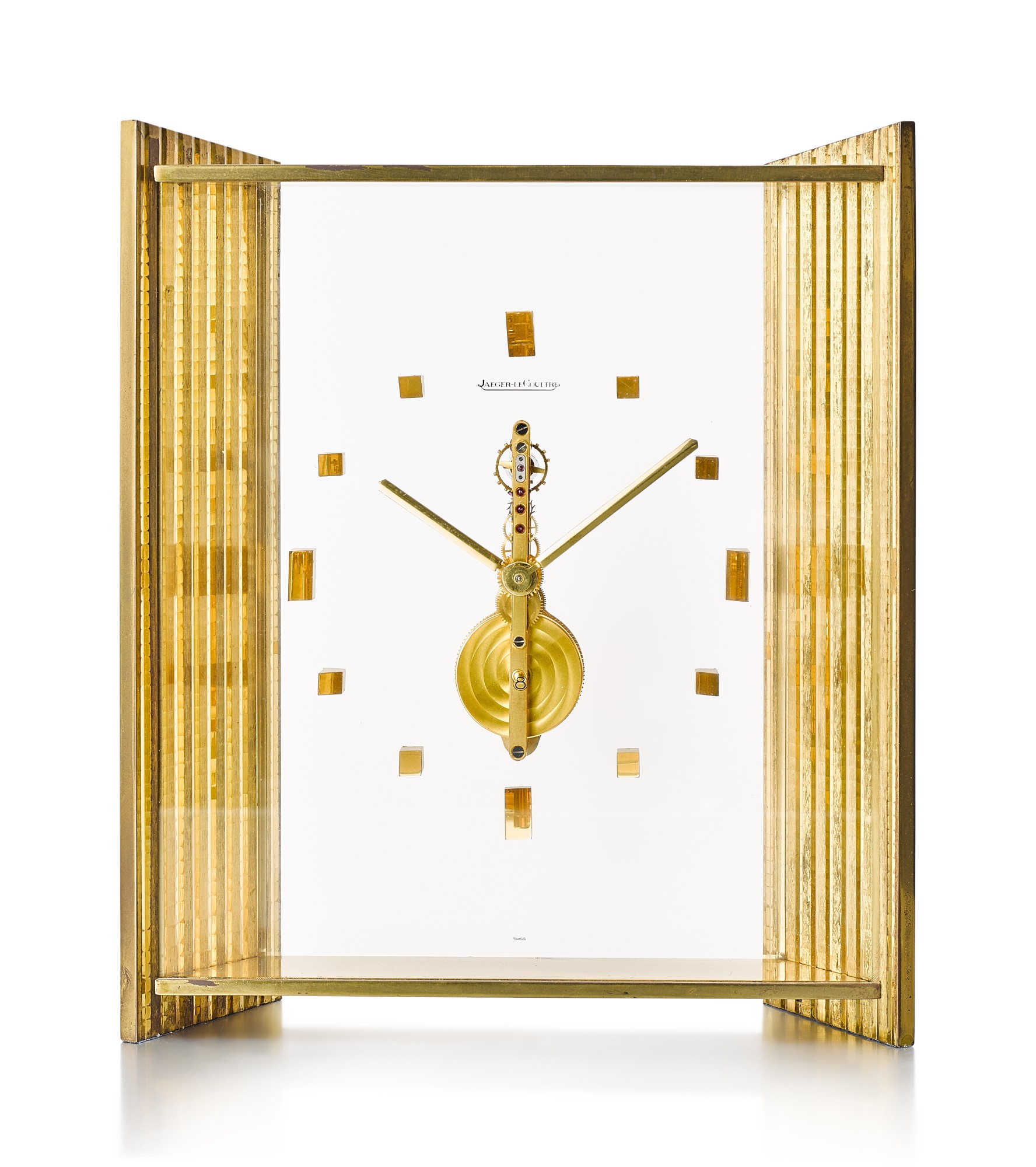 JAEGER-LECOULTRE | A GILT BRASS TABLE CLOCK WITH 8 DAYS POWER RESERVE ...