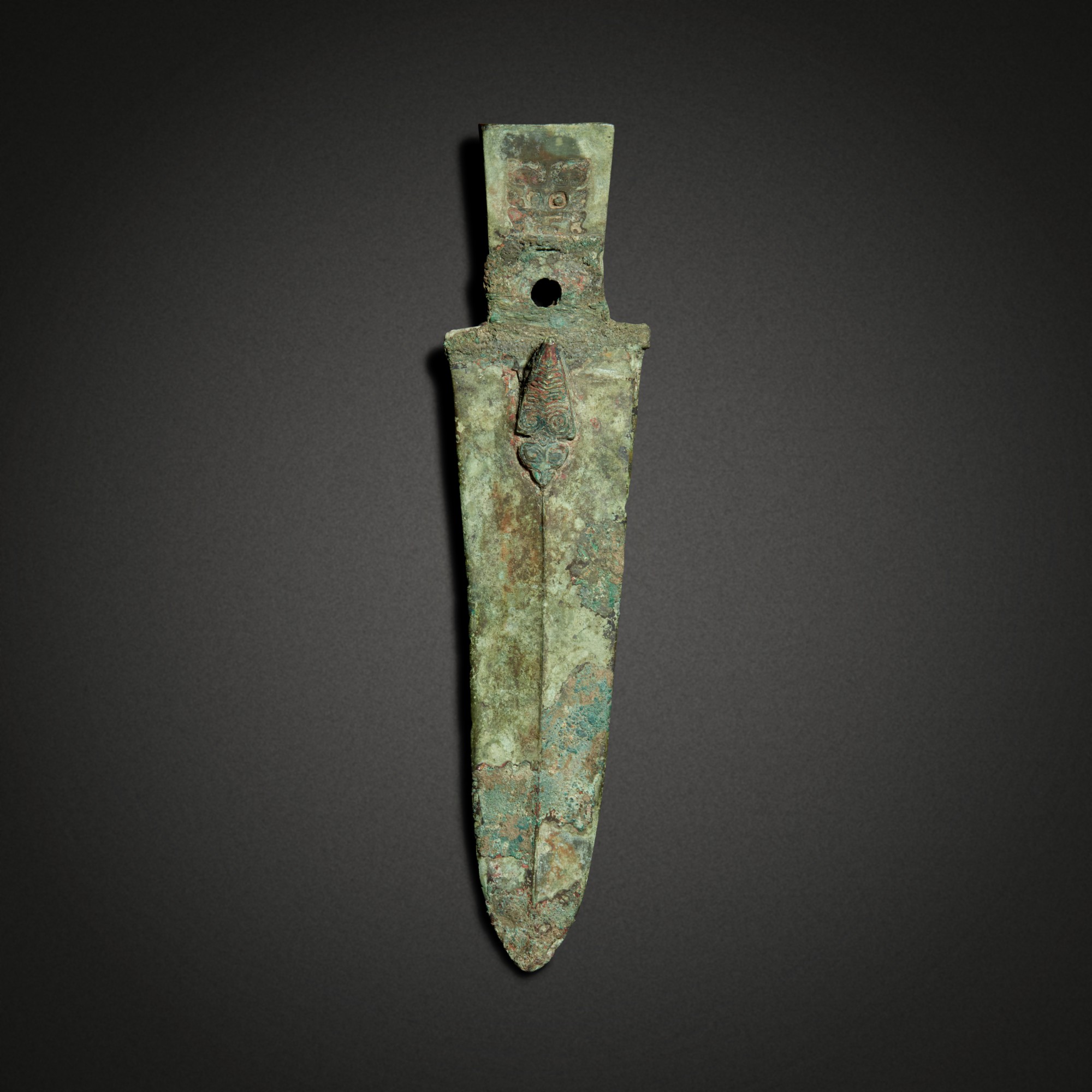 A rare archaic bronze 'taotie and cicada' dagger axe (Ge), Late Shang ...