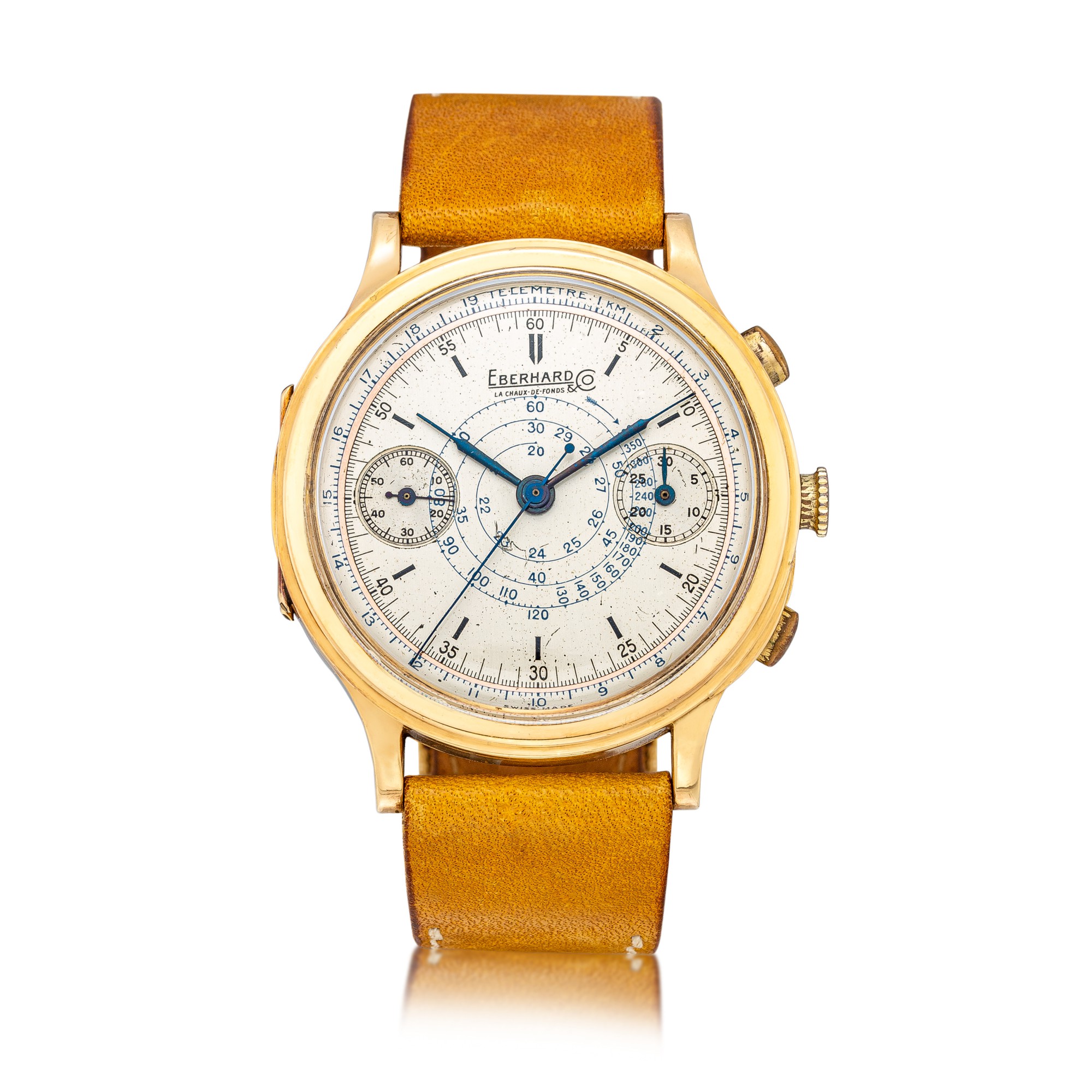 A yellow gold single button chronograph wristwatch with start/stop ...