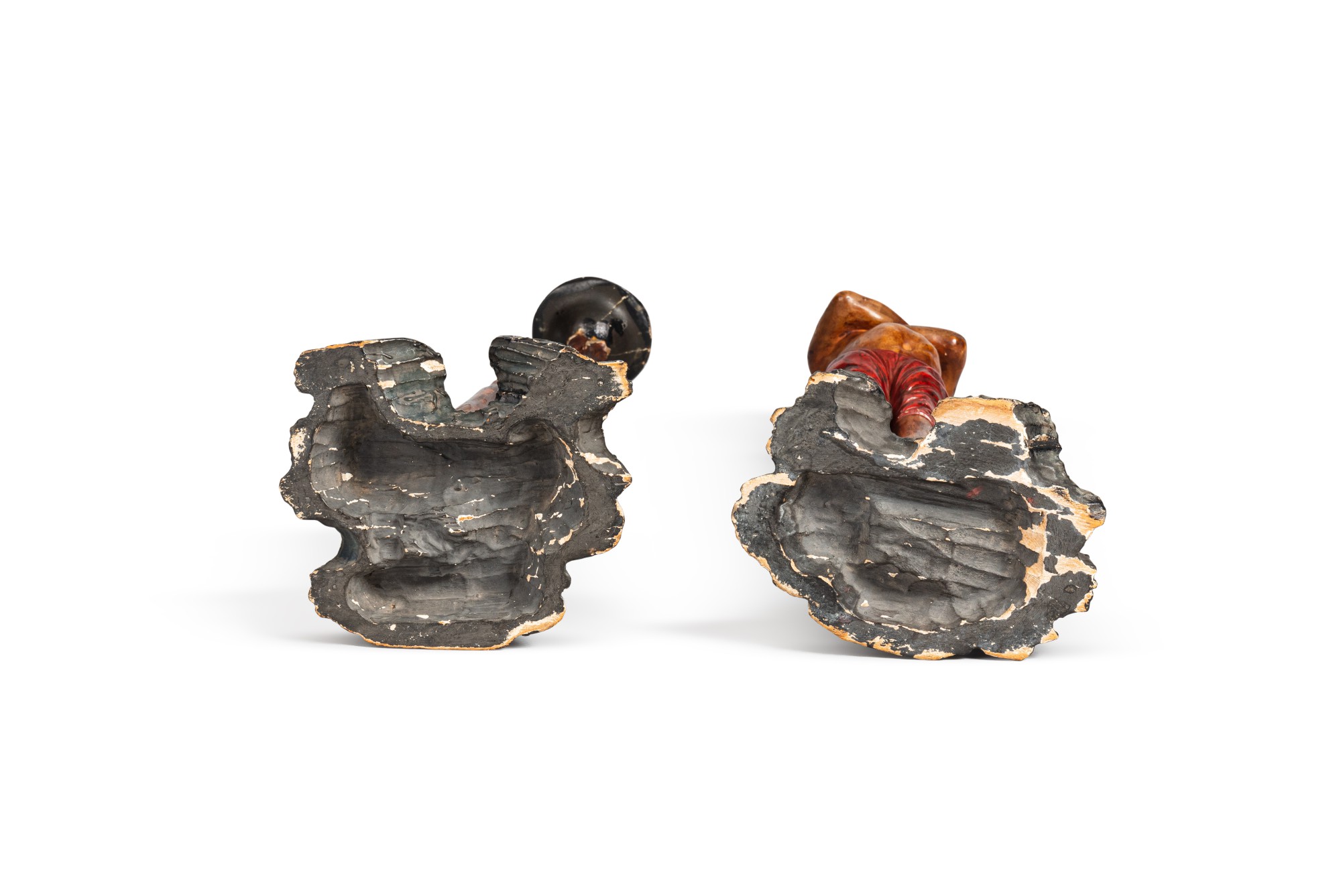 Two rare lacquered wood candlesticks depicting Ashinaga and Tanaga ...