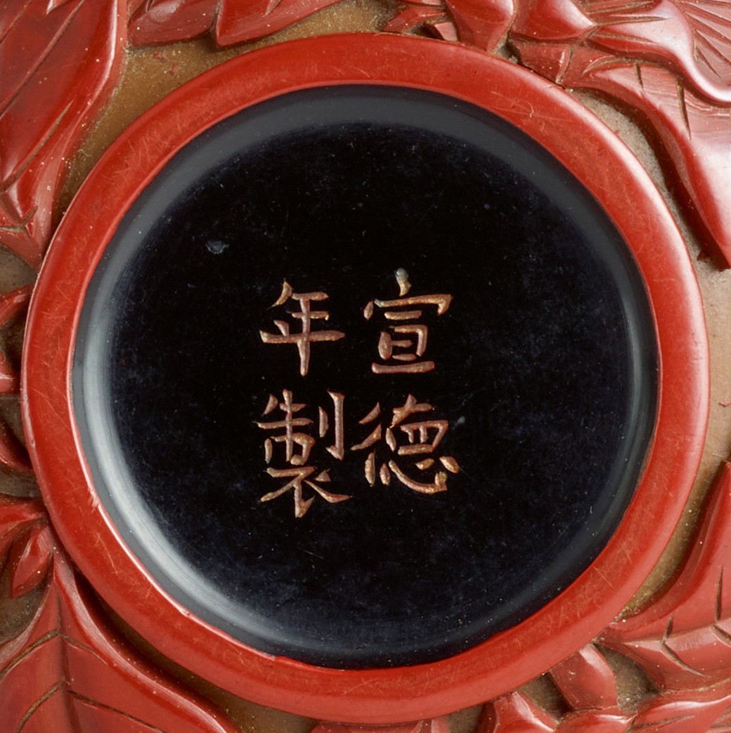 A cinnabar lacquer 'camellia' circular box and cover Ming dynasty ...