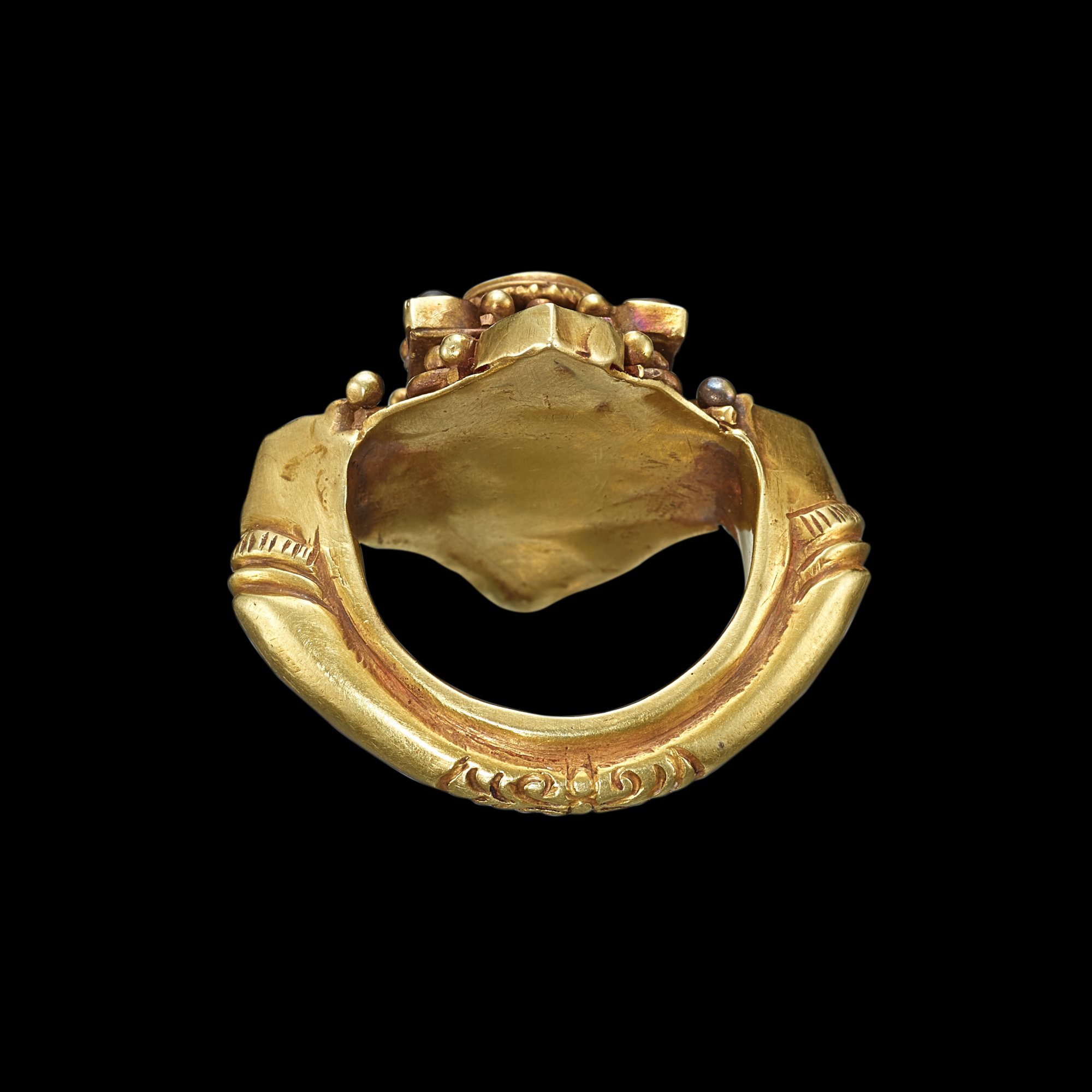 A solid gold and macle stone ring with floral bezel Champa, 7th-12th ...