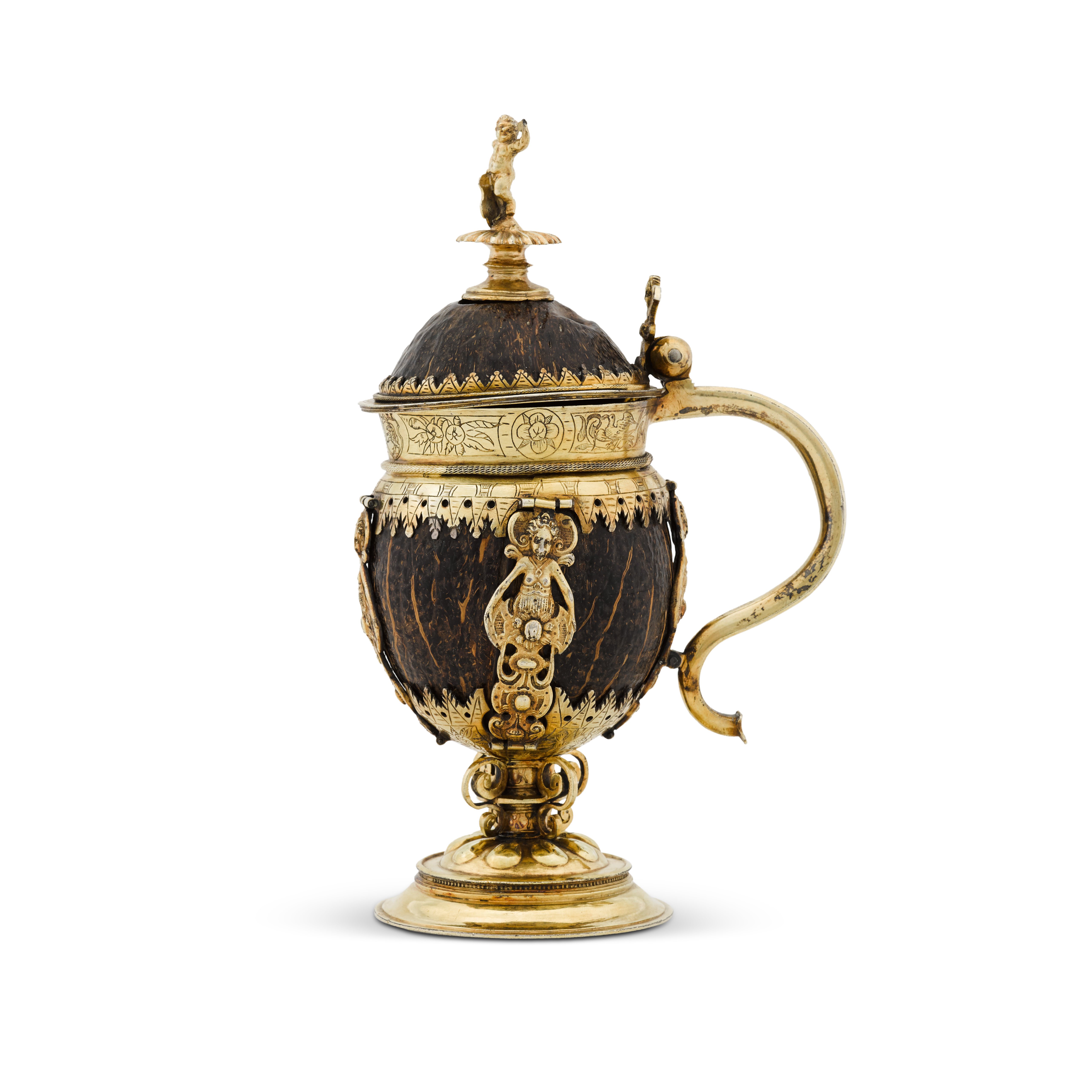 A 17th century silver-gilt-mounted coconut tankard, unmarked, probably ...