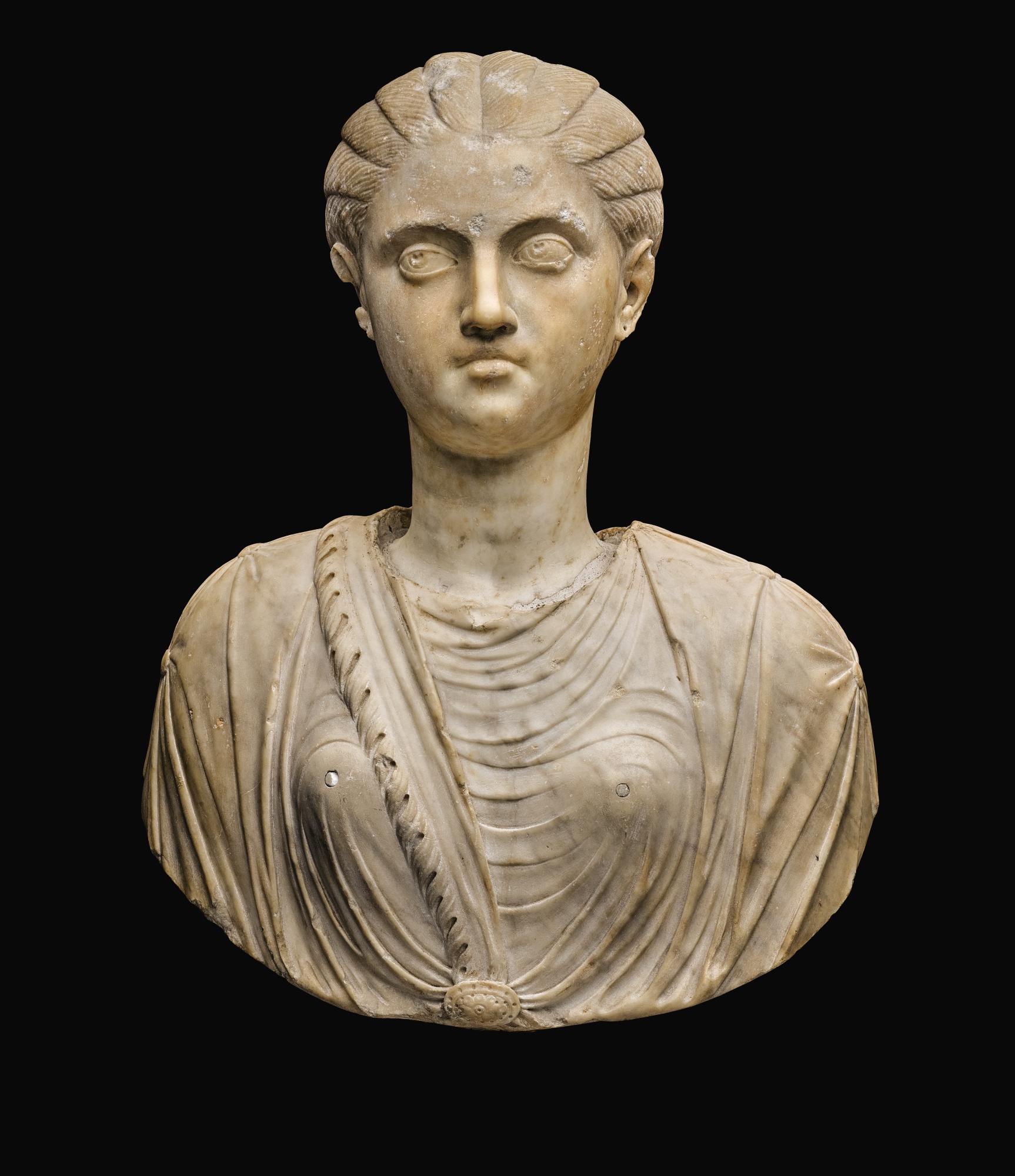 A ROMAN MARBLE PORTRAIT HEAD OF A YOUNG WOMAN, SEVERAN, EARLY 3RD ...