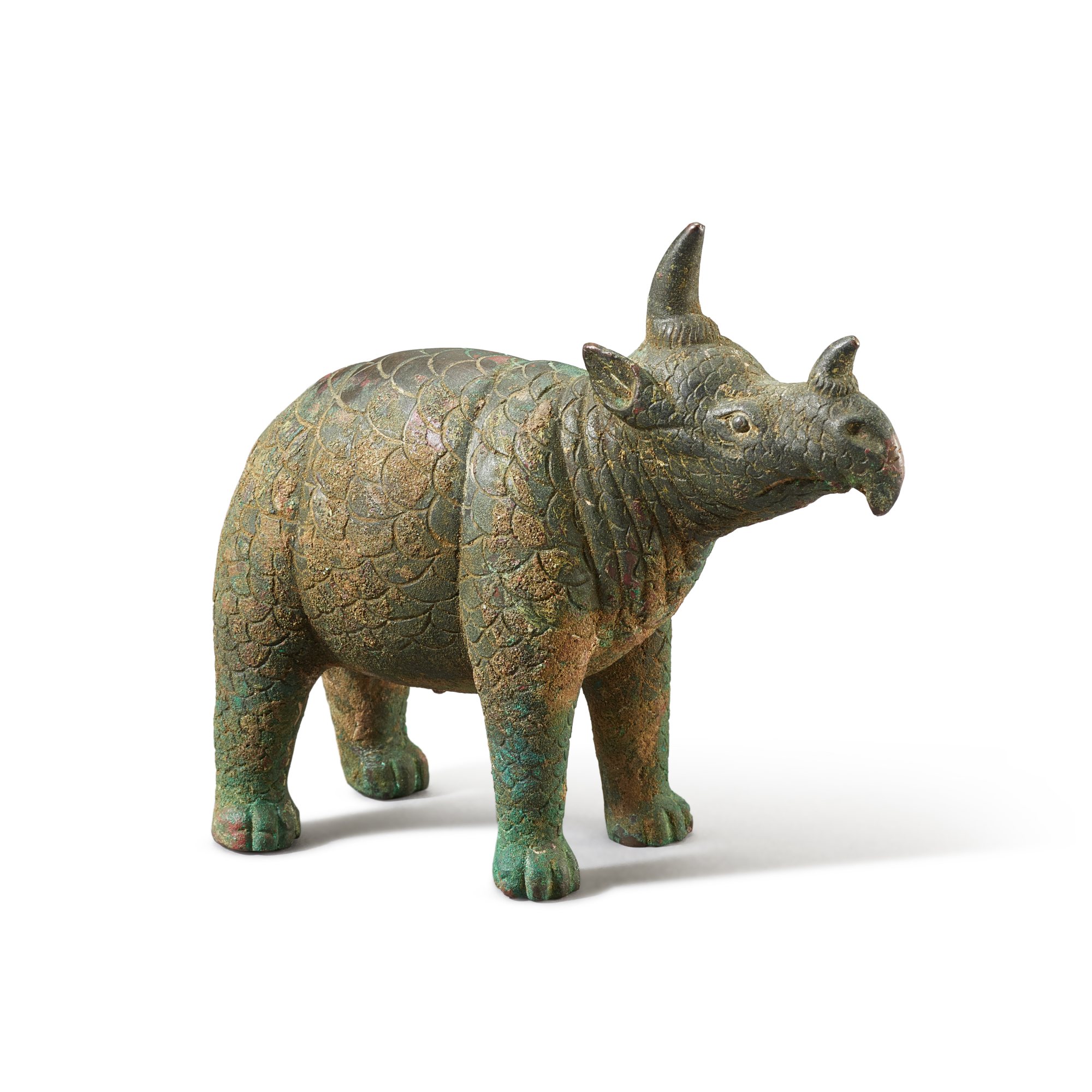 A rare small bronze figure of a rhinoceros, Tang dynasty | 唐 青銅犀牛 ...