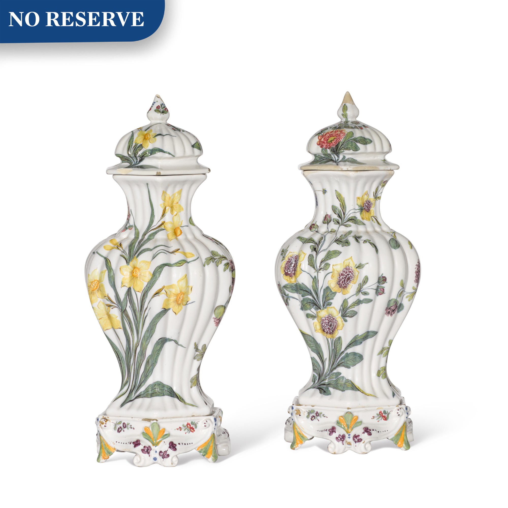 A pair of Nove maiolica hexagonal section baluster vases, covers and ...