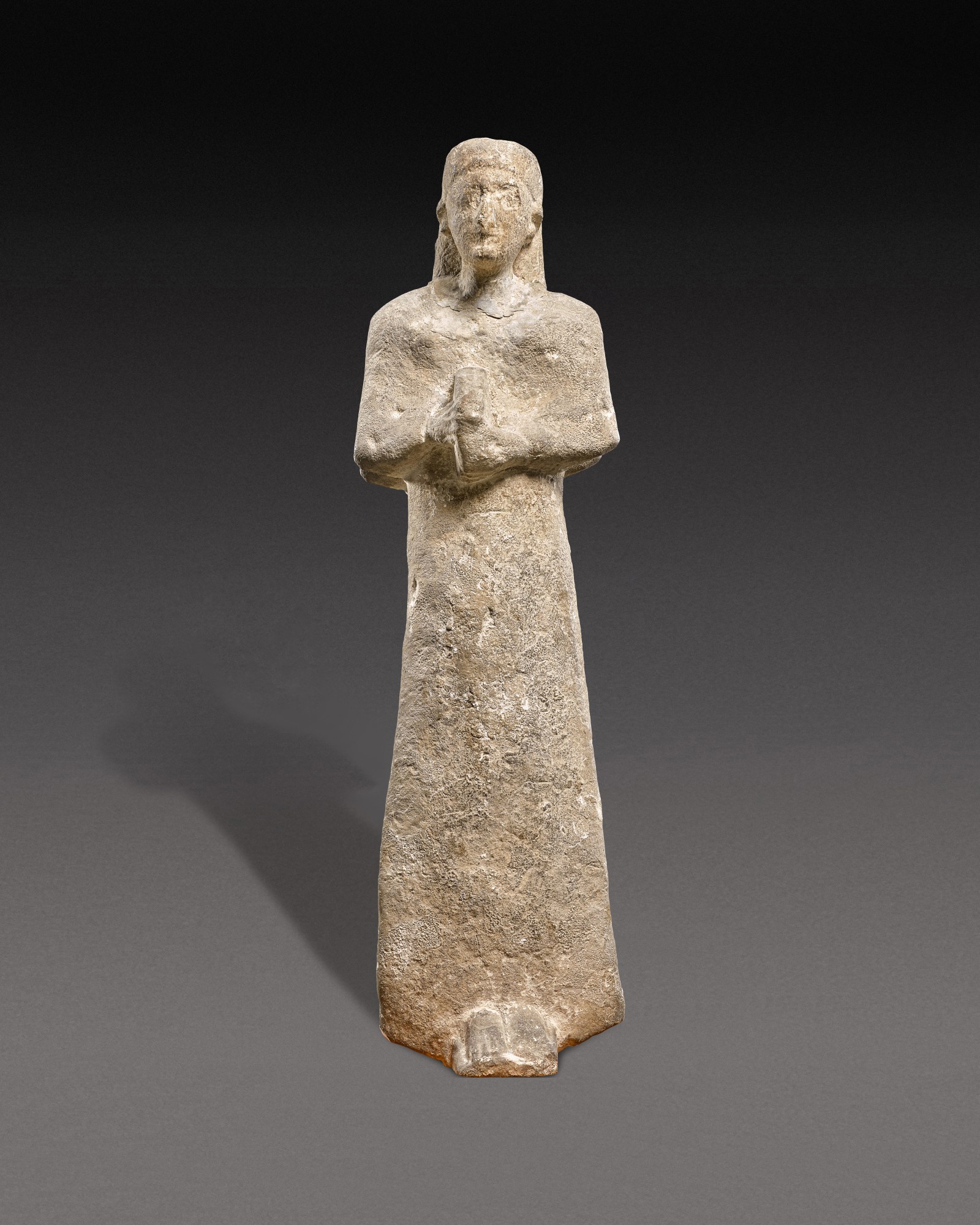 A Cypriot Limestone Votive Figure of a Musician, 2nd/3rd quarter of the ...