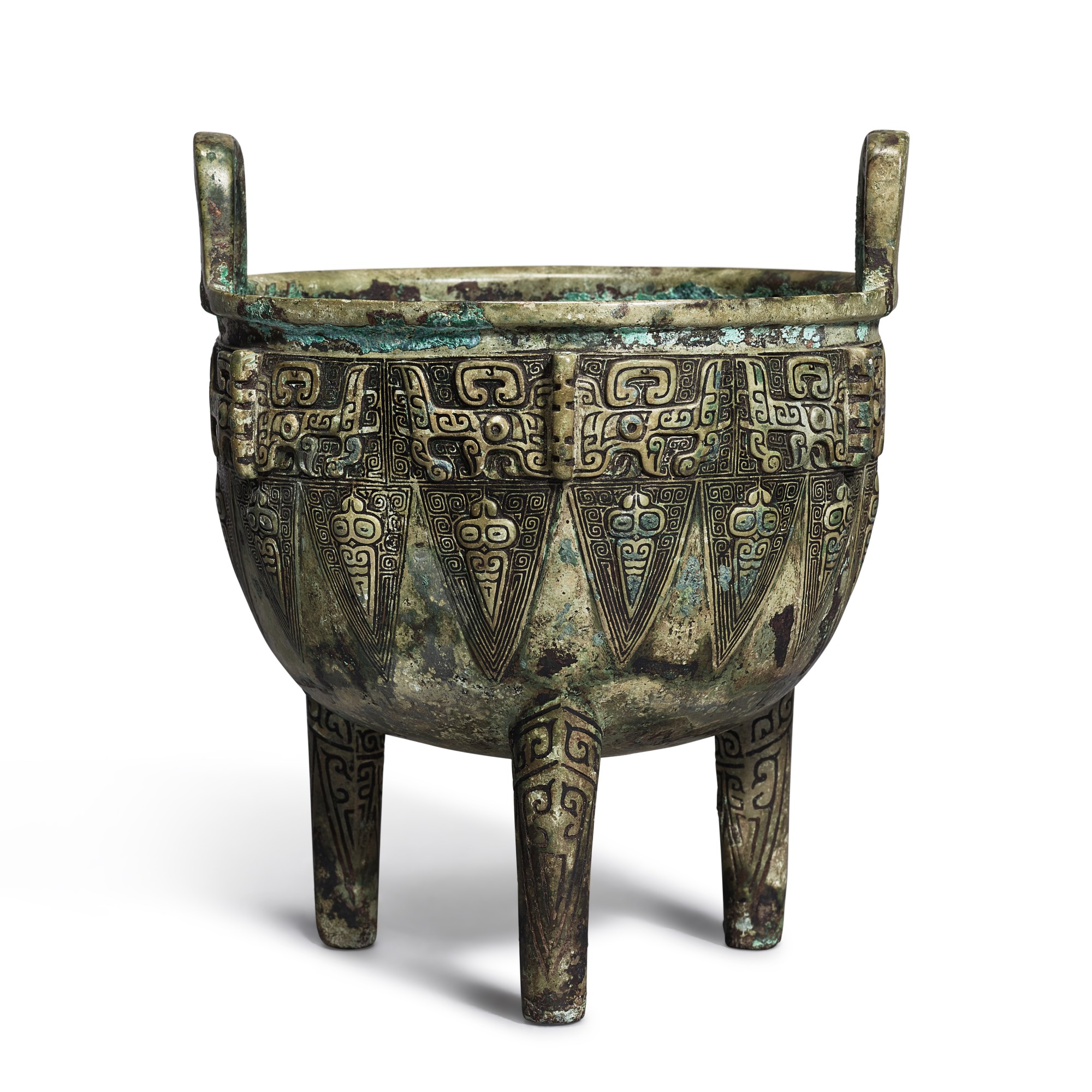 A superb inscribed archaic bronze 'animal mask' food vessel (ding ...