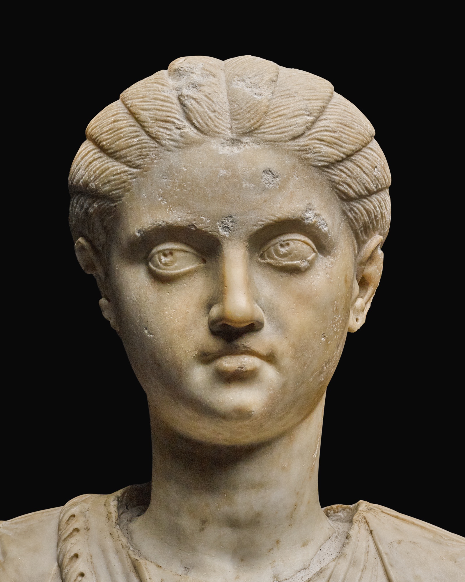 A ROMAN MARBLE PORTRAIT HEAD OF A YOUNG WOMAN, SEVERAN, EARLY 3RD ...