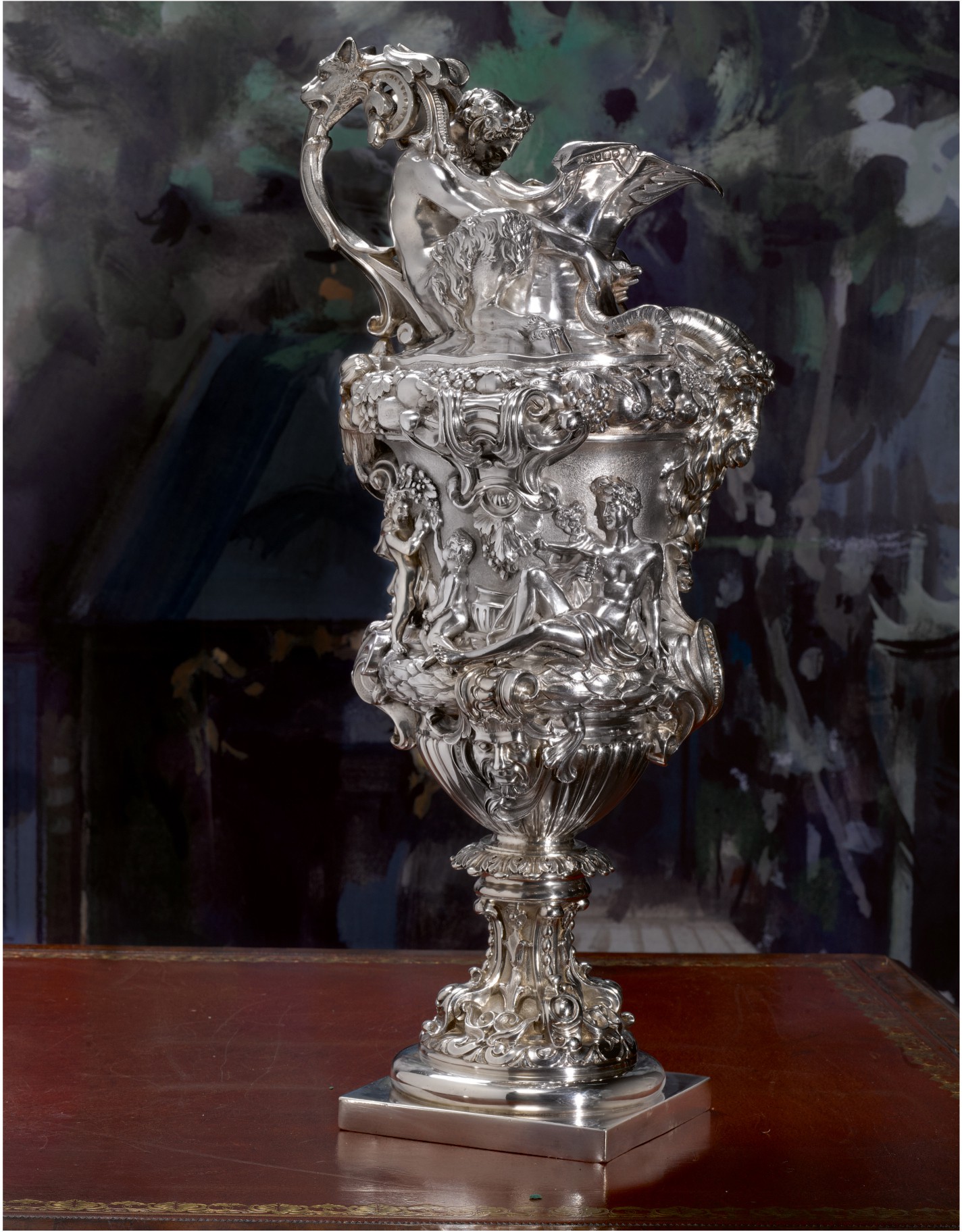 A PAIR OF LARGE AND HEAVY EARLY VICTORIAN SILVER EWERS, FROM THE ...