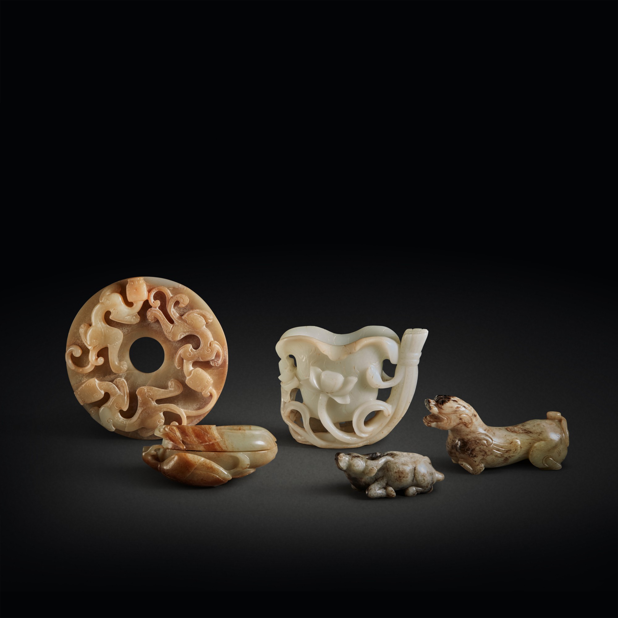 A beige and brown jade figure of a bixie, Ming dynasty or later | 明或以後 ...