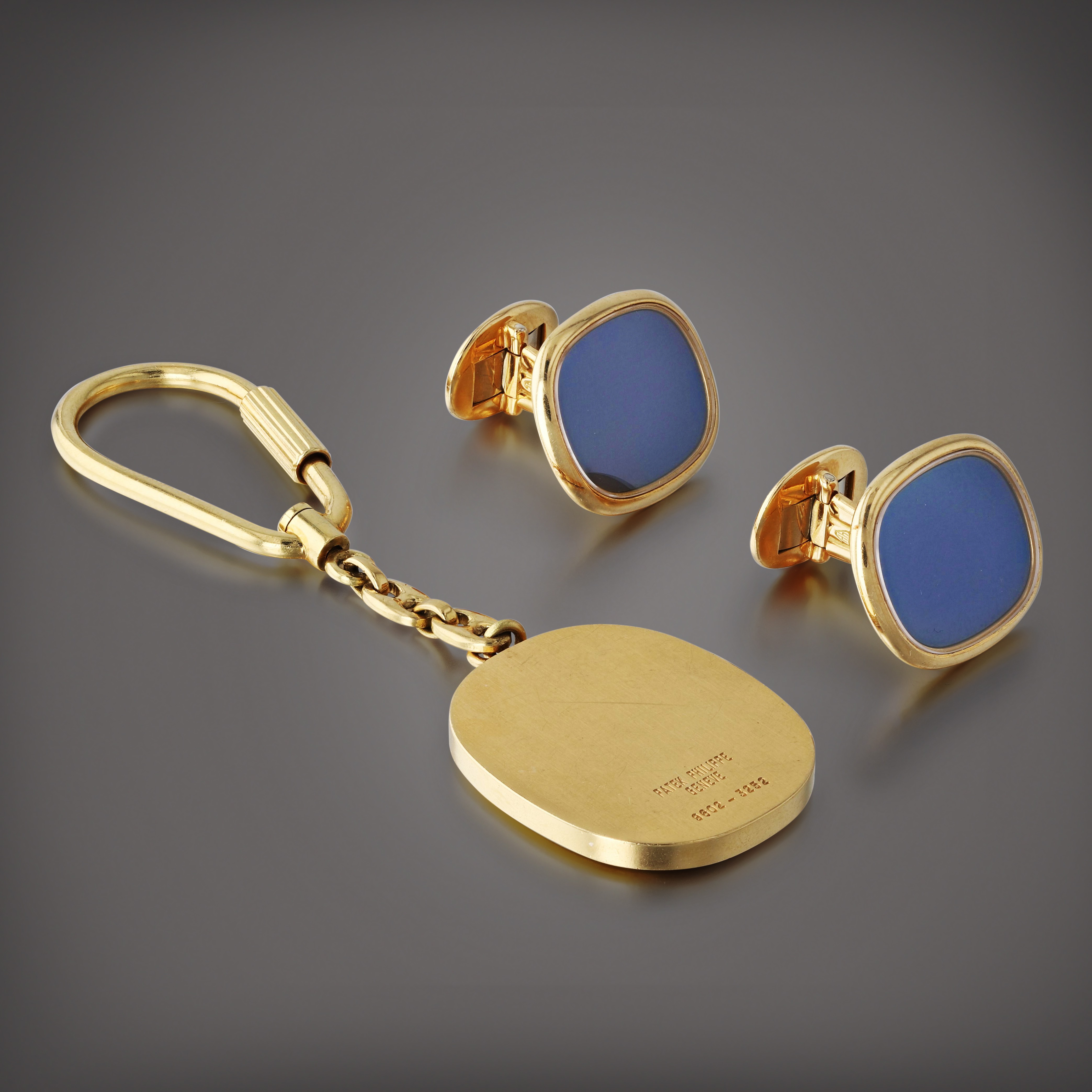Patek Philippe | Porte-clés et paire de boutons de manchette | Key ring ...