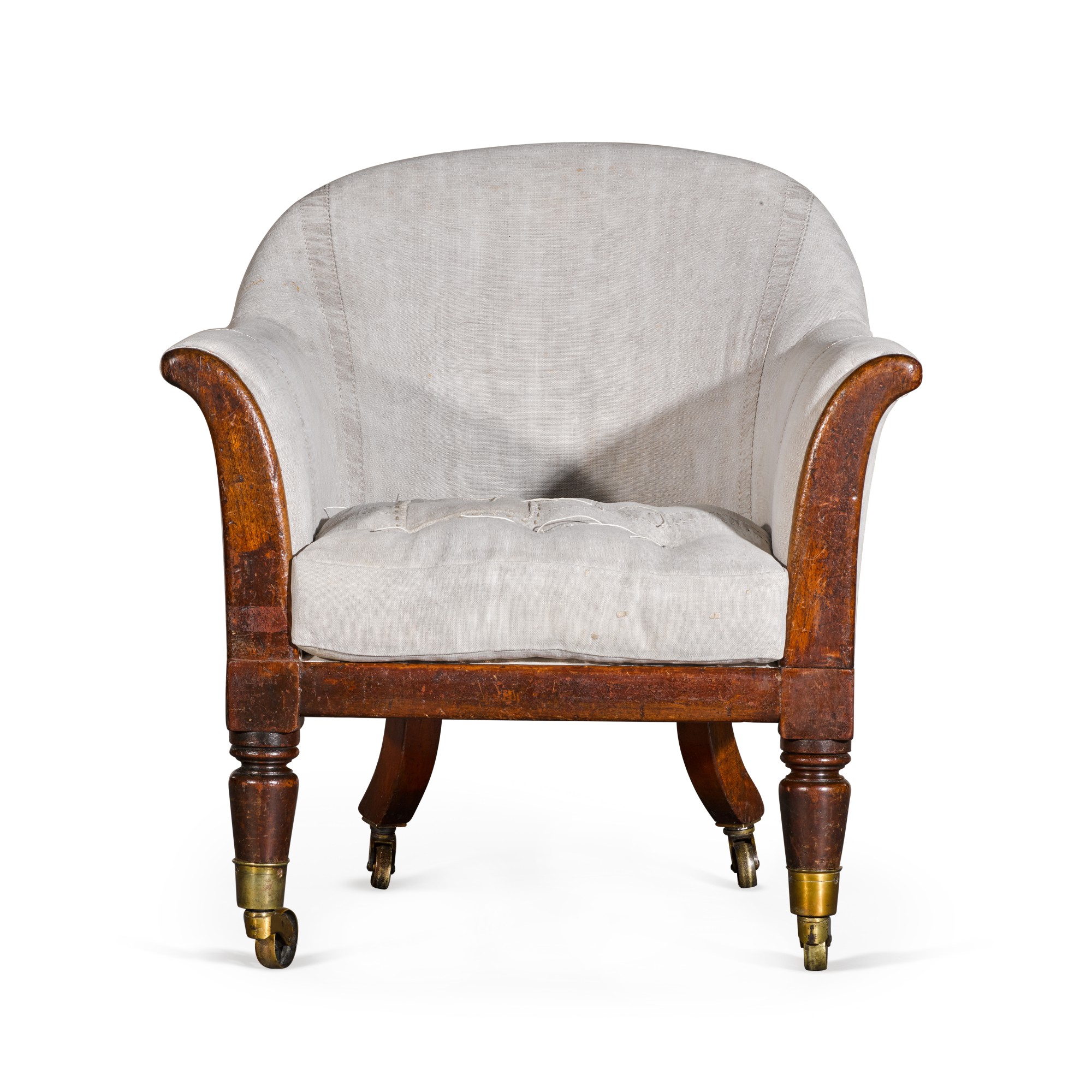 A LATE REGENCY MAHOGANY AND UPHOLSTERED LIBRARY TUB ARMCHAIR, SECOND ...