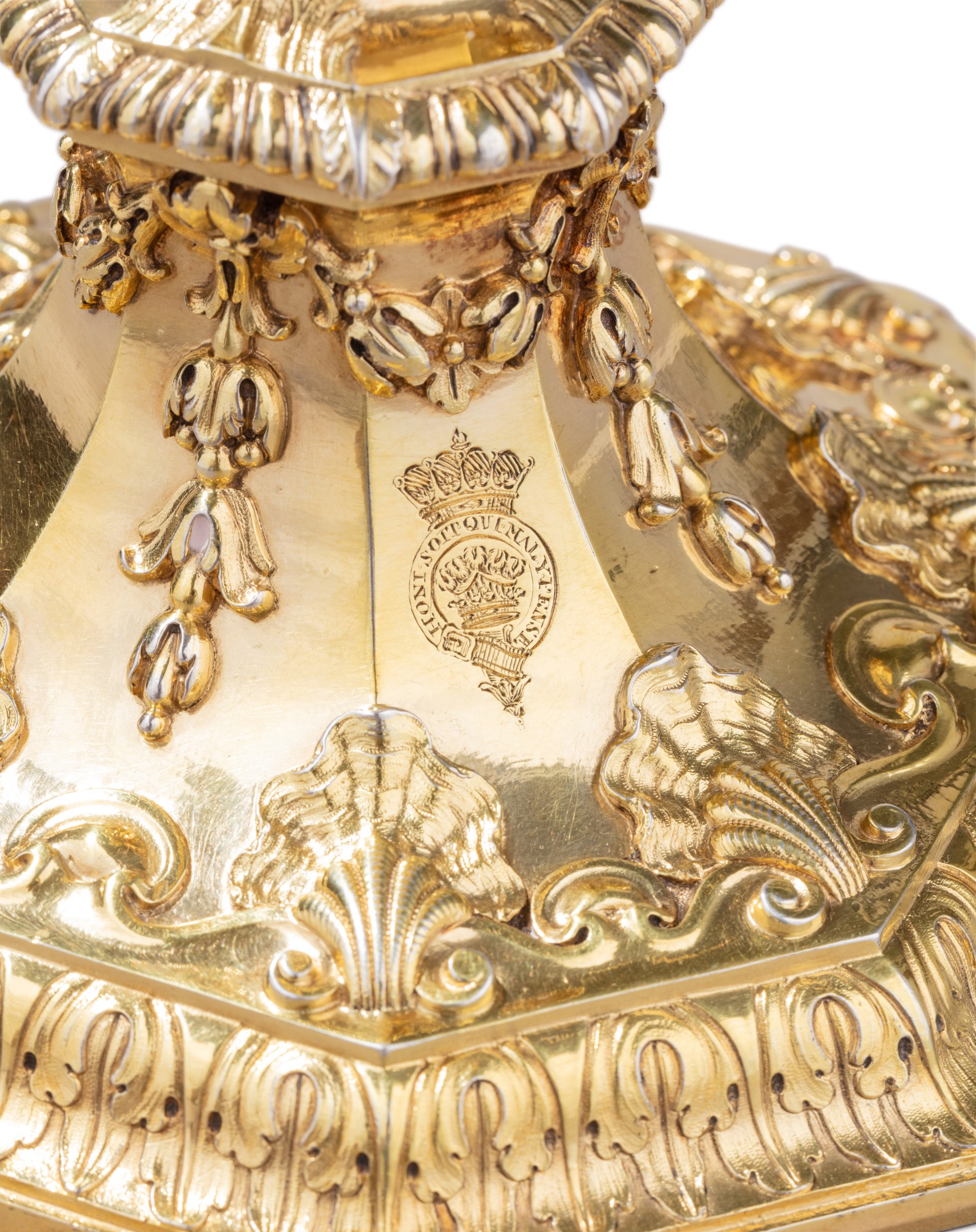 A set of four George II silver-gilt candlesticks from the Pelham ...