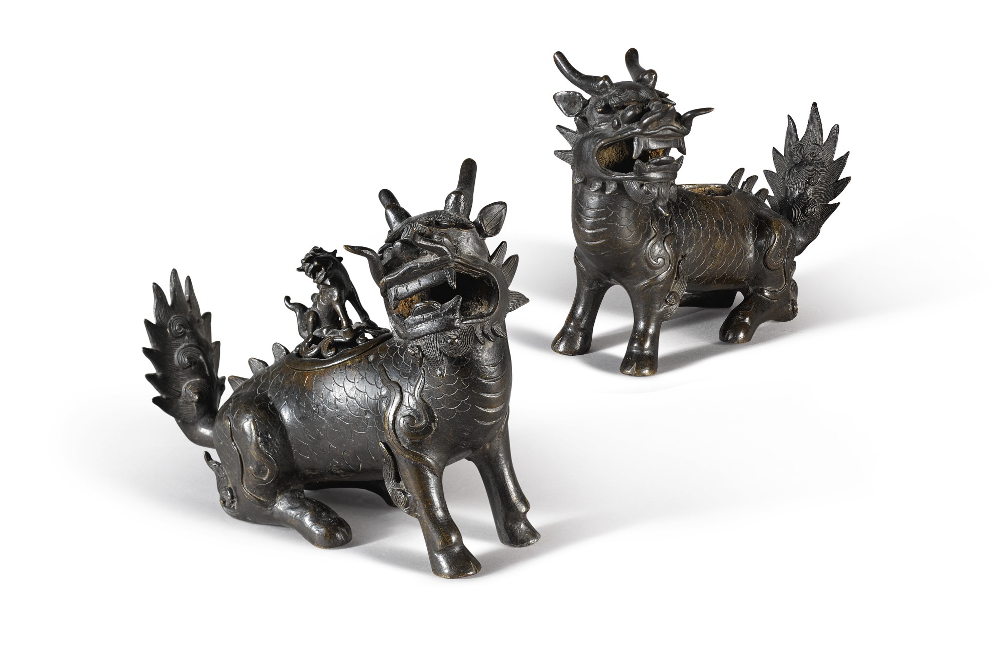 A pair of bronze 'mythical beast' censers and cover, 17th century | The ...