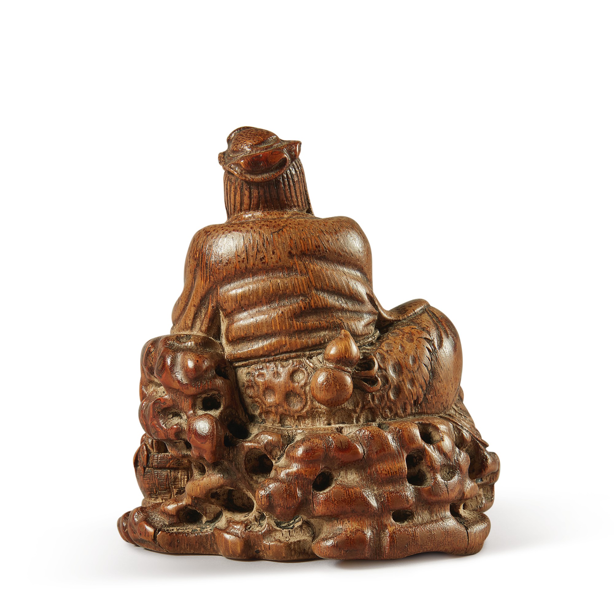 AN INSCRIBED BAMBOO-ROOT FIGURE OF A DAOIST IMMORTAL, QING DYNASTY ...