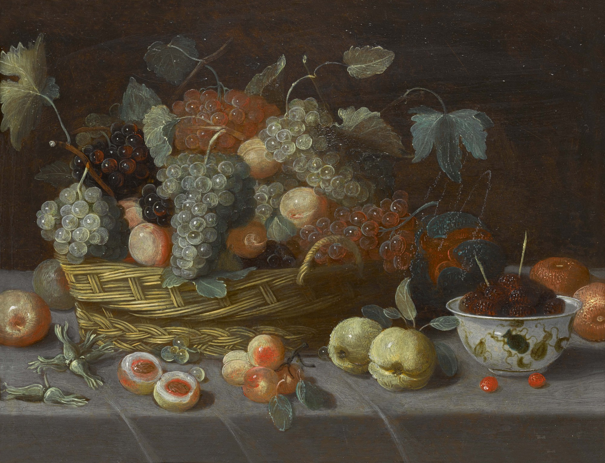 Still life with a fruit basket and a Ming bowl on a table | Old Master ...