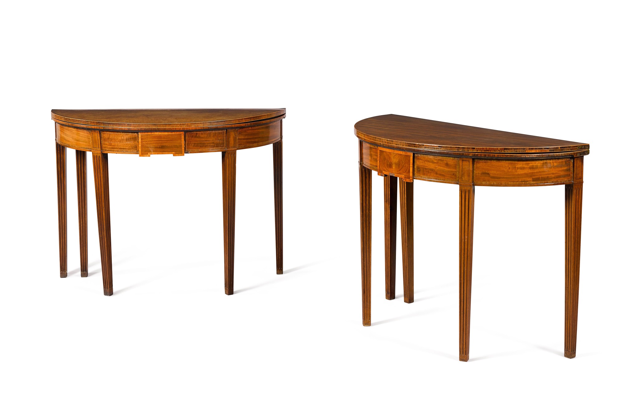A pair of George III boxwood strung and crossbanded mahogany demi-lune ...