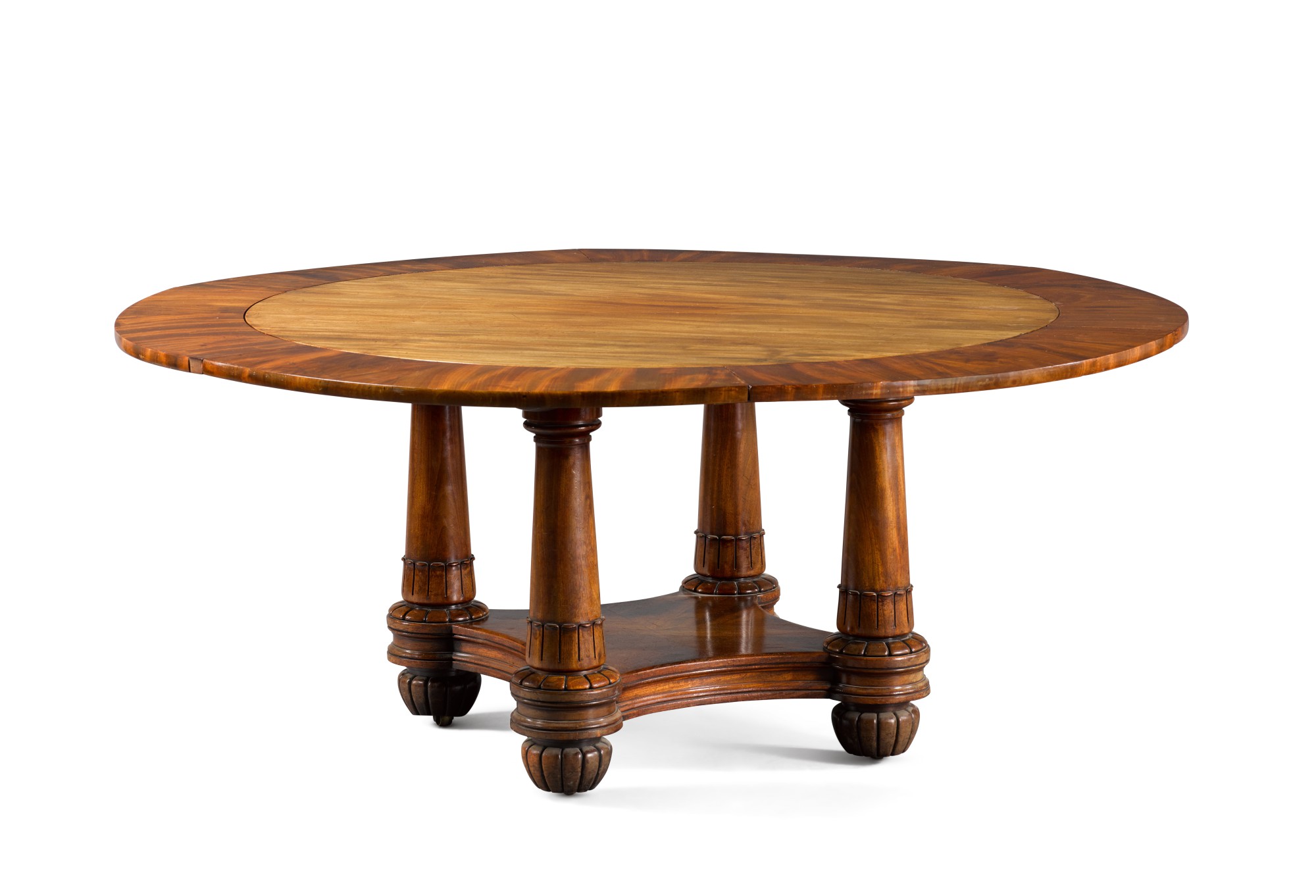 A GEORGE IV MAHOGANY EXTENDING CIRCULAR CENTRE OR DINING TABLE, CIRCA ...