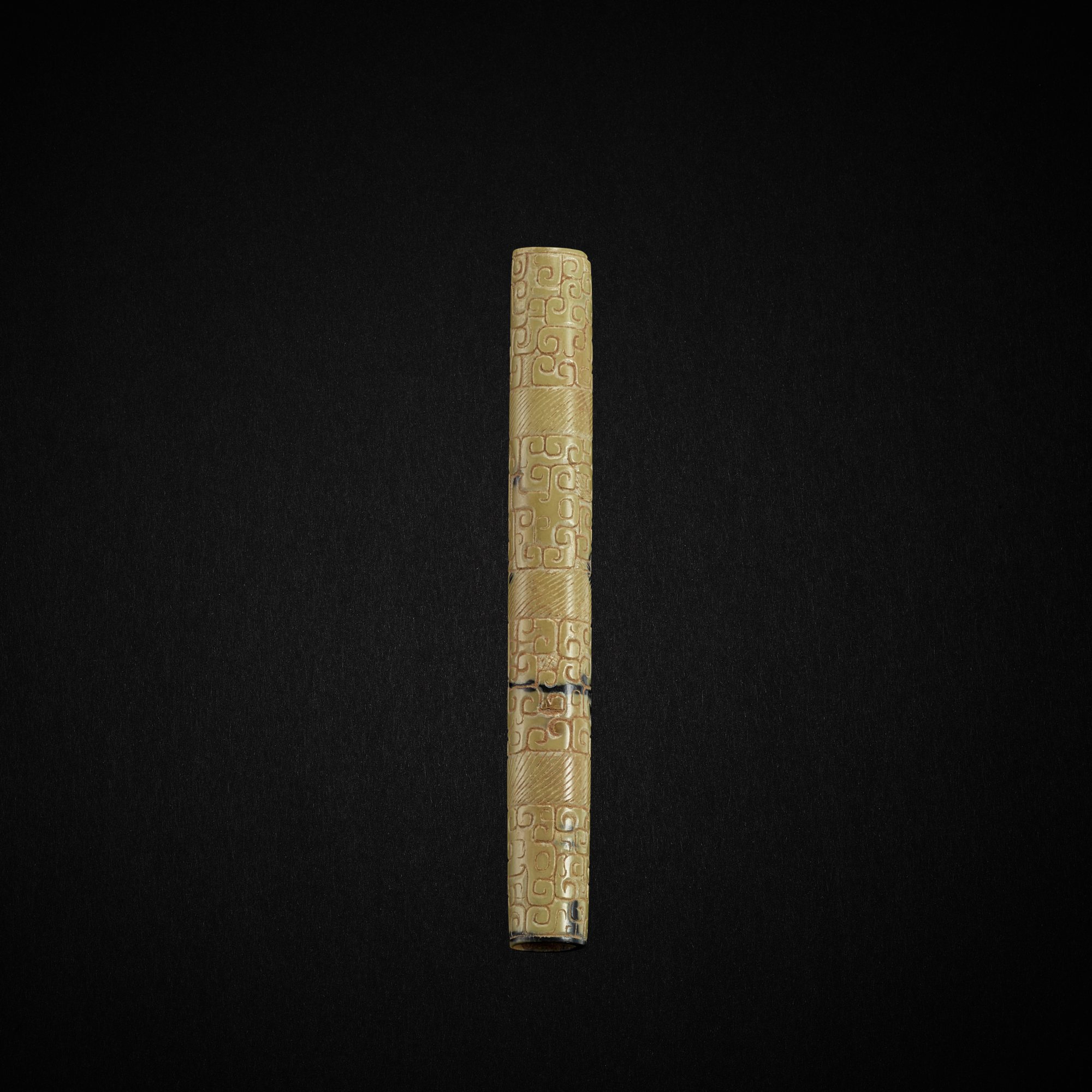 A celadon jade carved 'cloud' cylindrical tube, Eastern Zhou dynasty 東周 ...