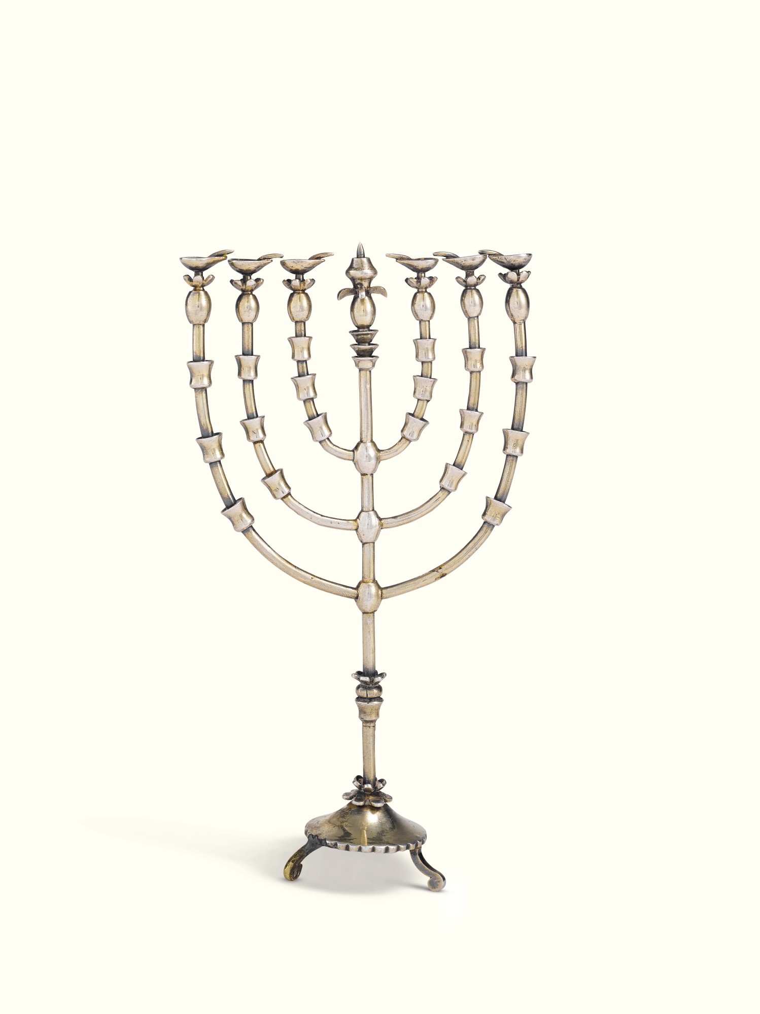 A MINIATURE SILVER-GILT MODEL OF THE TEMPLE MENORAH, PRESENTED TO YOUNG ...