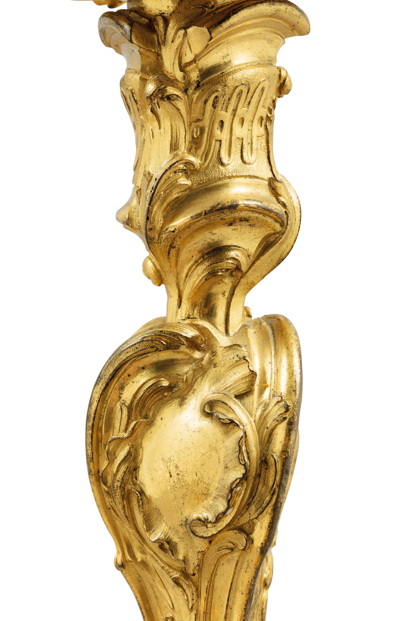 A pair of Louis XV gilt-bronze candlesticks, in the manner of Jules ...