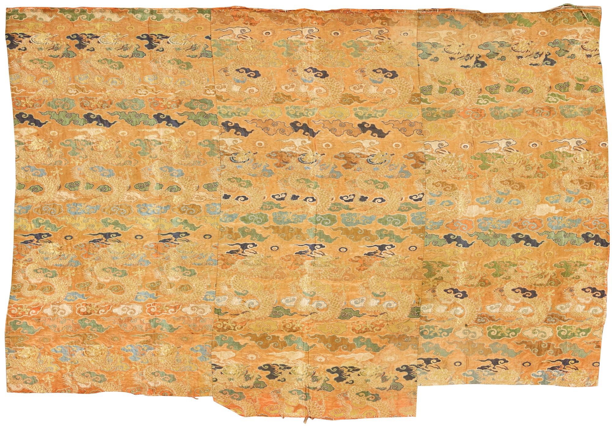 A RARE BROCADED SILK 'DRAGON' FRAGMENT MING DYNASTY | 明 杏地金綉雲龍趕珠紋織錦 ...